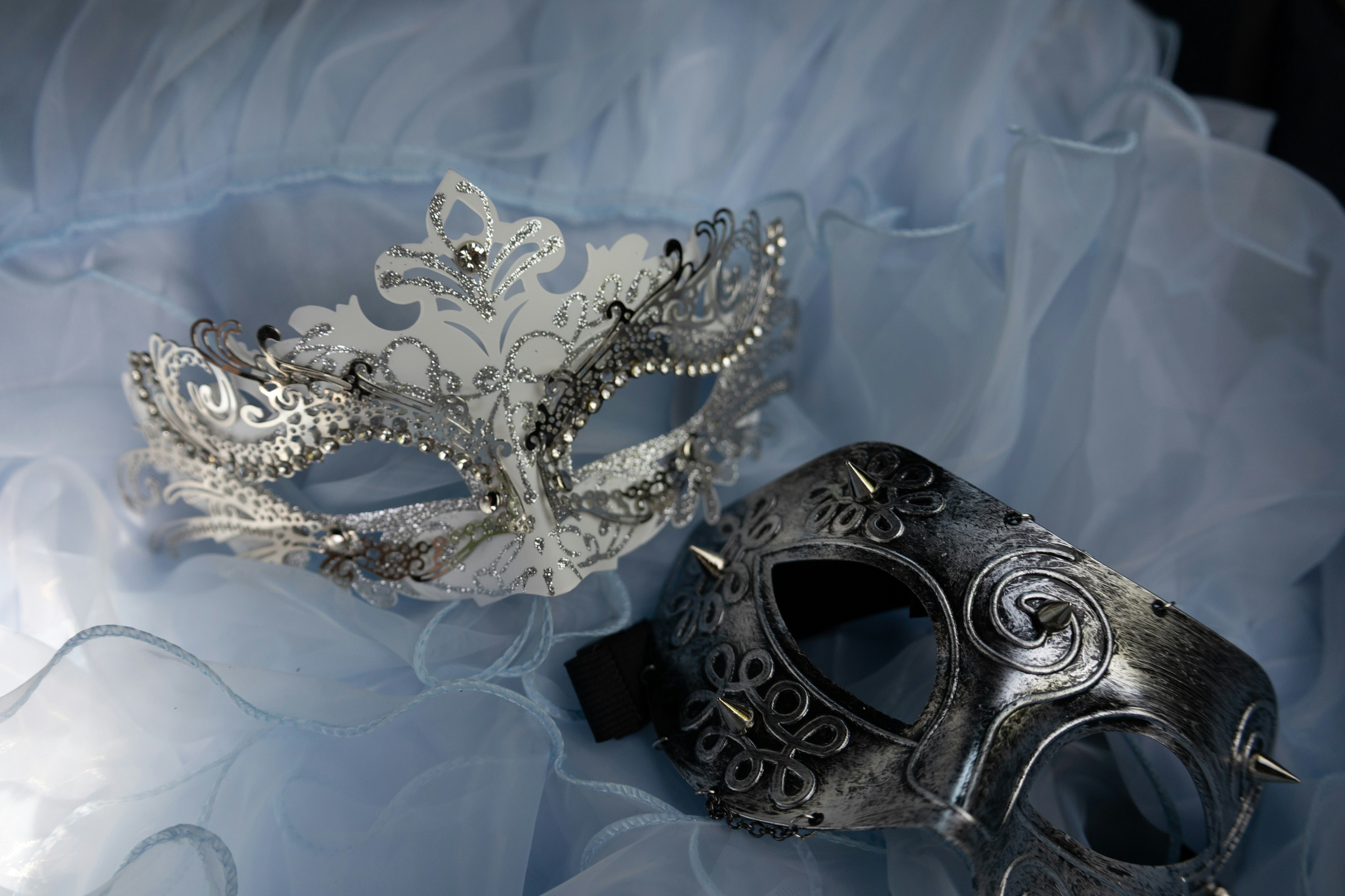 Dual Masquerade: Silver Crown and Midnight Mask on Light Blue Tulle