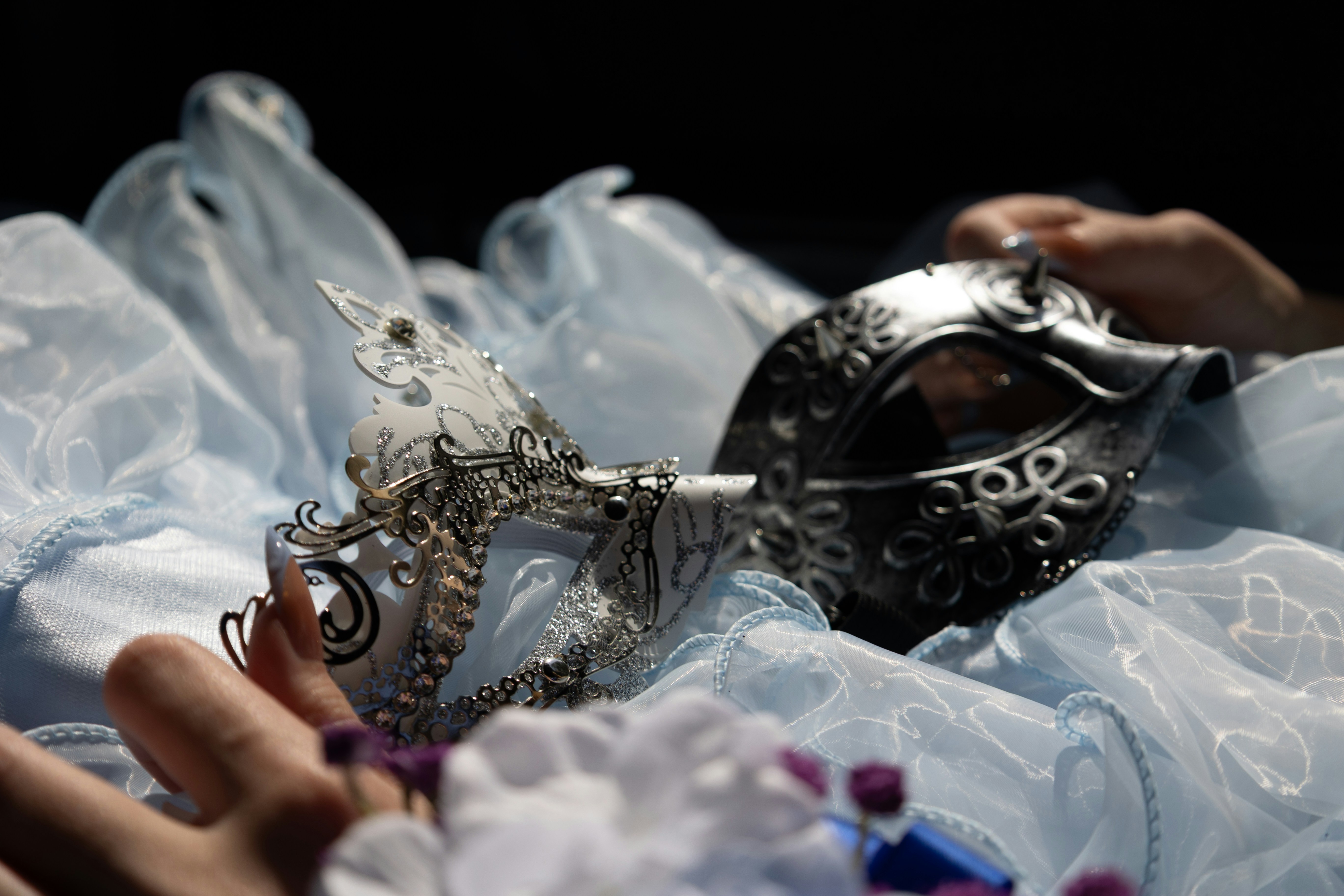Veiled Masks and Lace: Hidden Portraits in a Darkened Boudoir