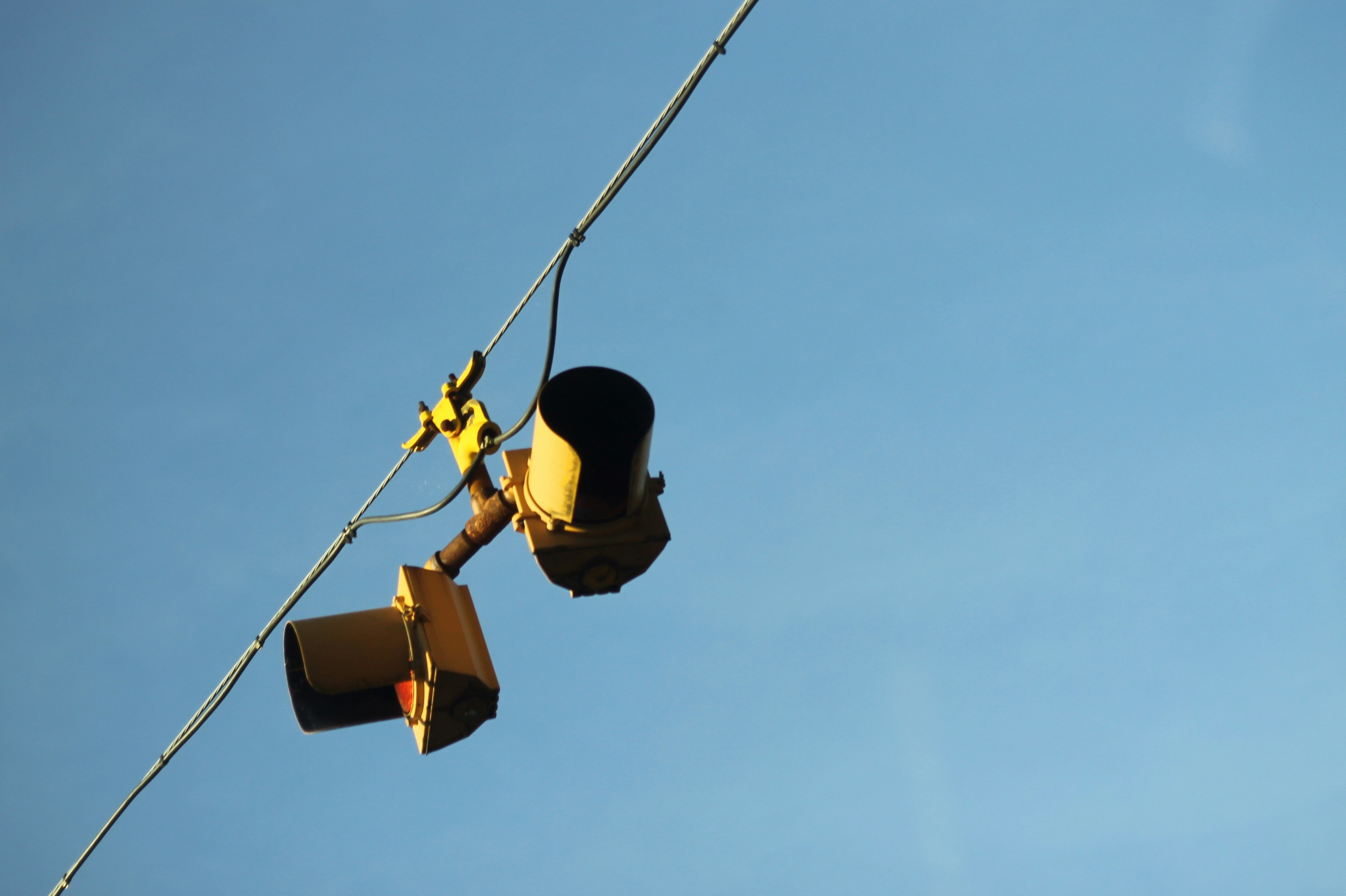 Suspended Signals Against a Clear Sky