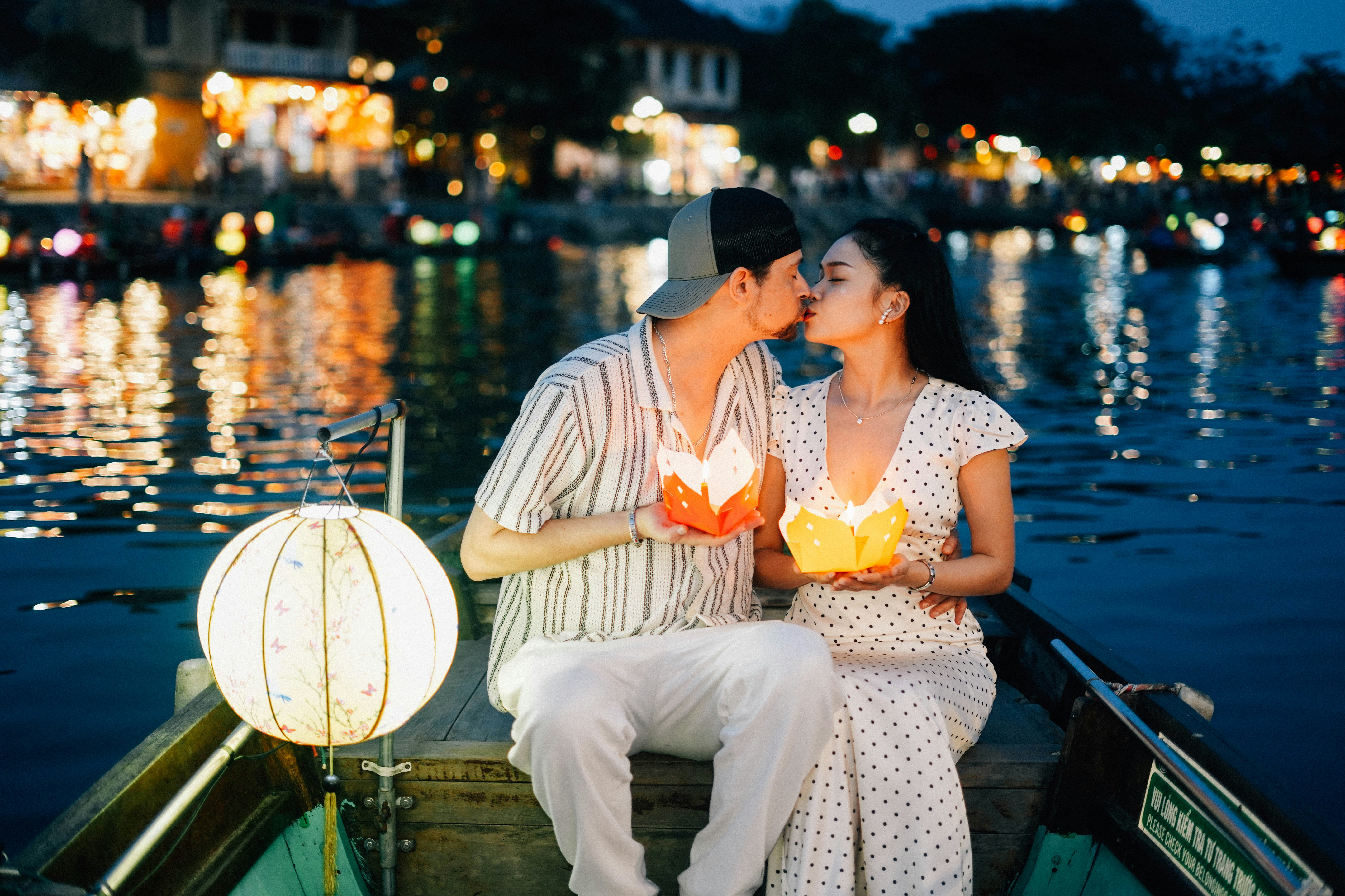 Moonlit Canoe Kiss on a Lakeside Promenade