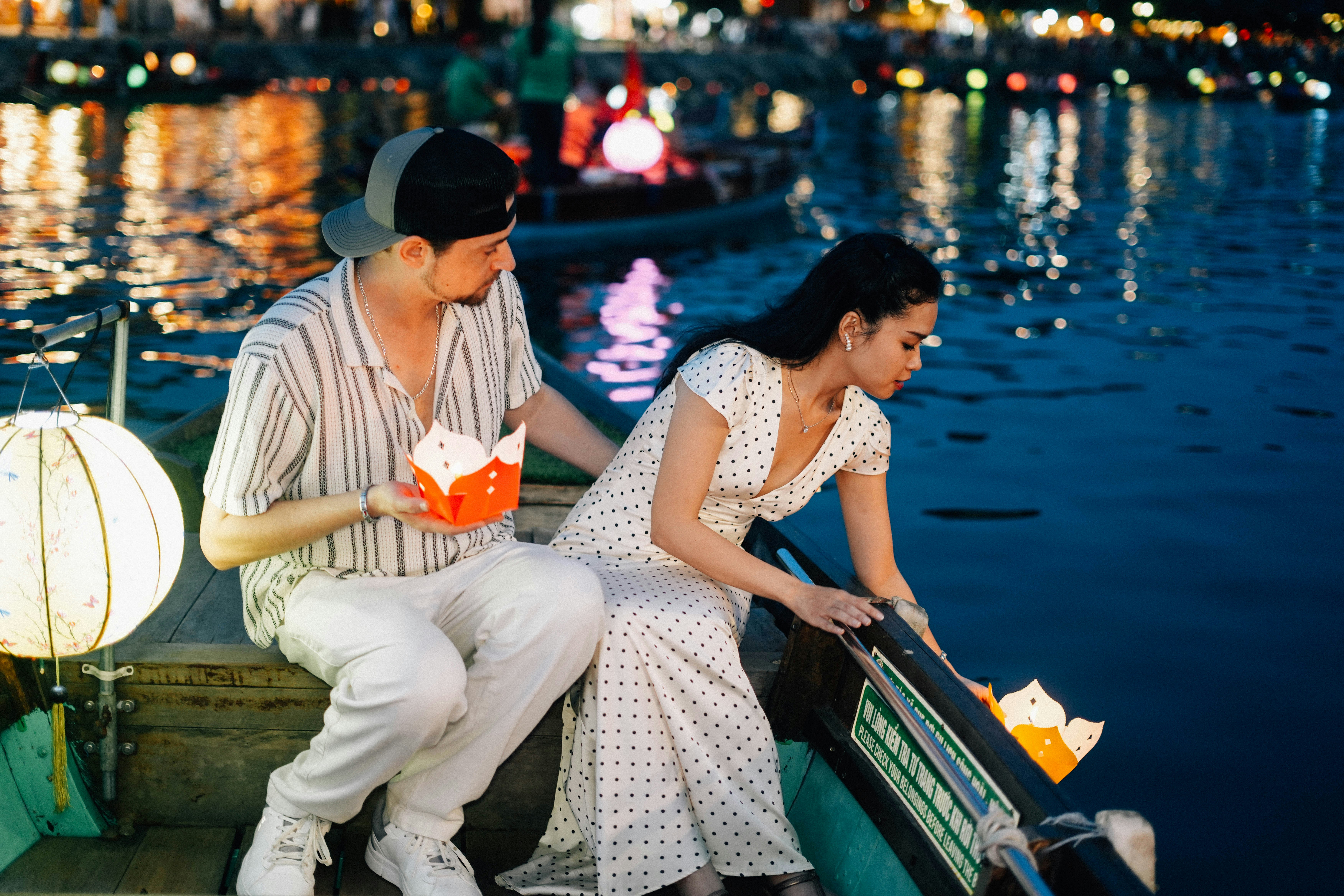 Moonlit Boat Ride: Two Friends Sharing Lanterns at the Dock