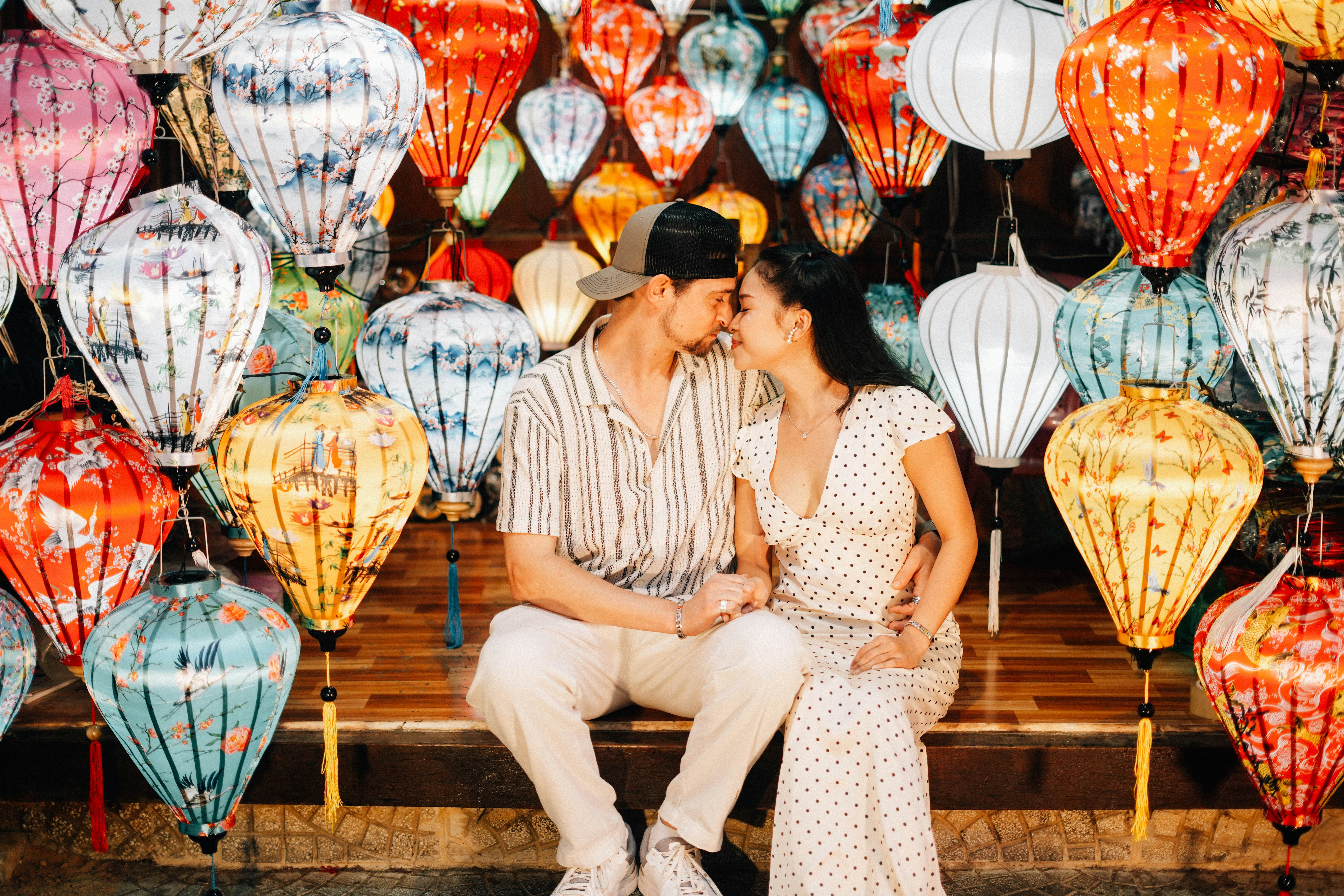 Lantern-lit Whisper: A Moment Between Two Under a Sky of Orbs