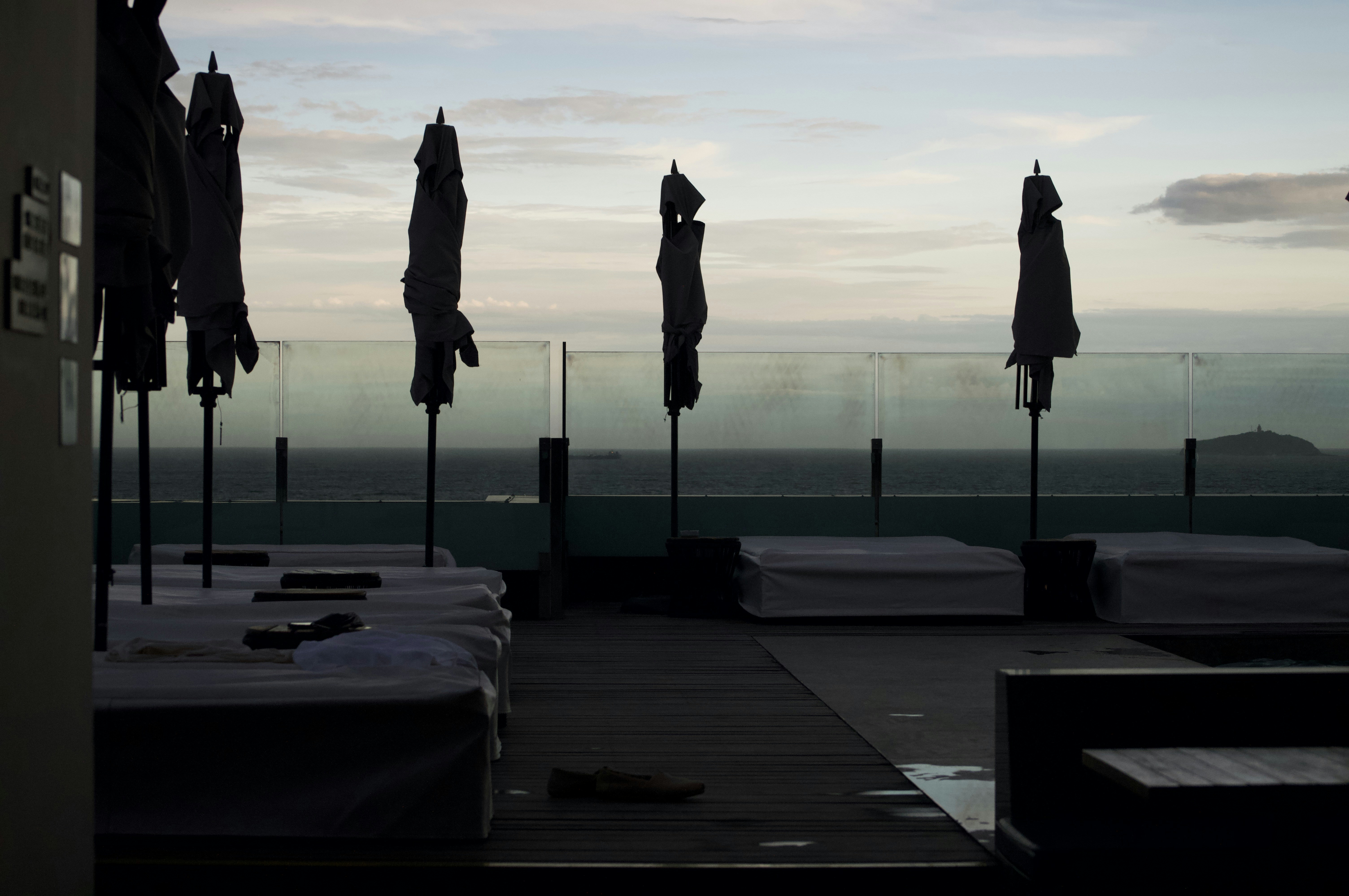 Sunset Over the Lounging Deck with Private Umbrellas