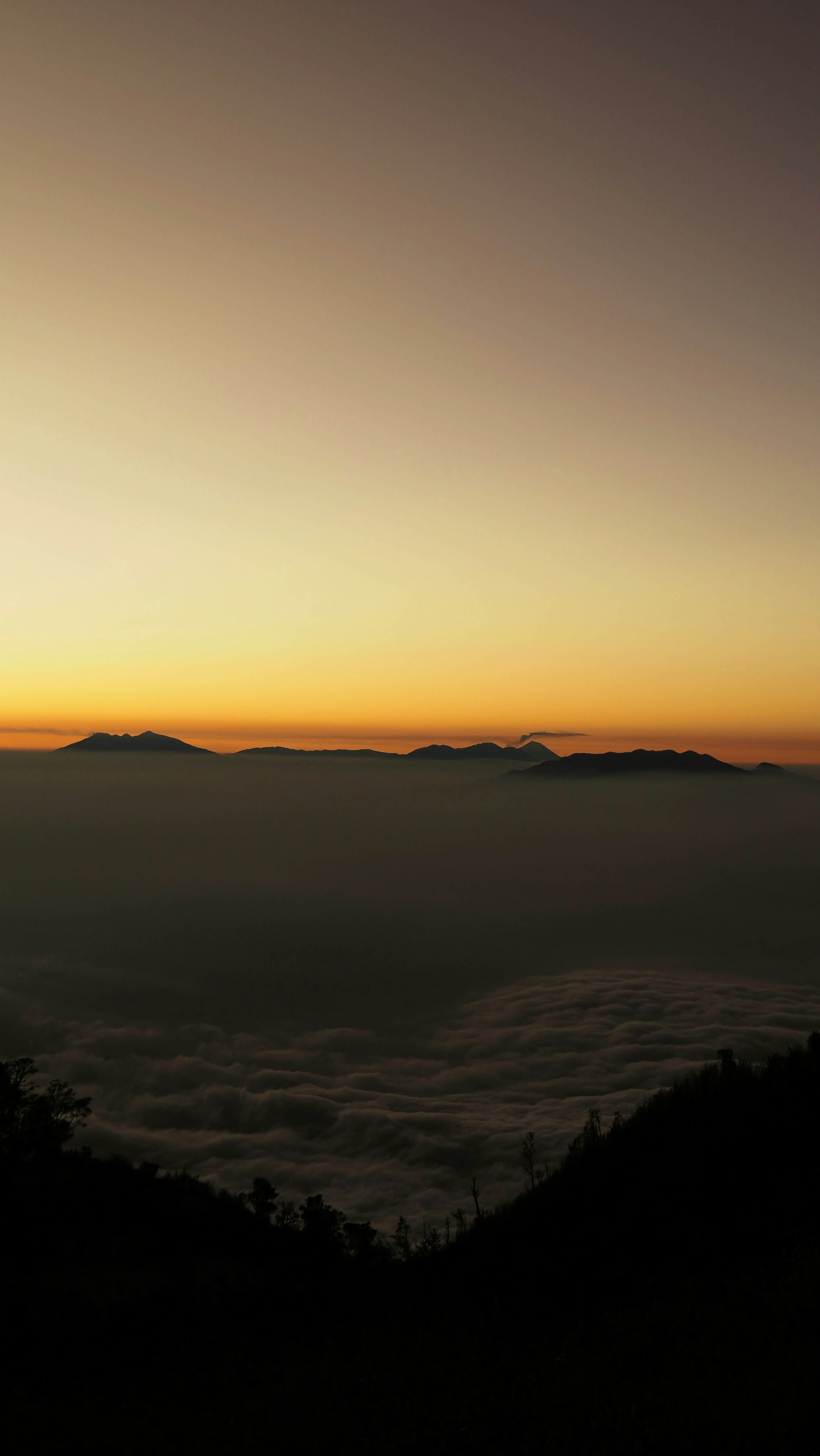 Dawn Above the Sea of Clouds on a Quiet Ridge