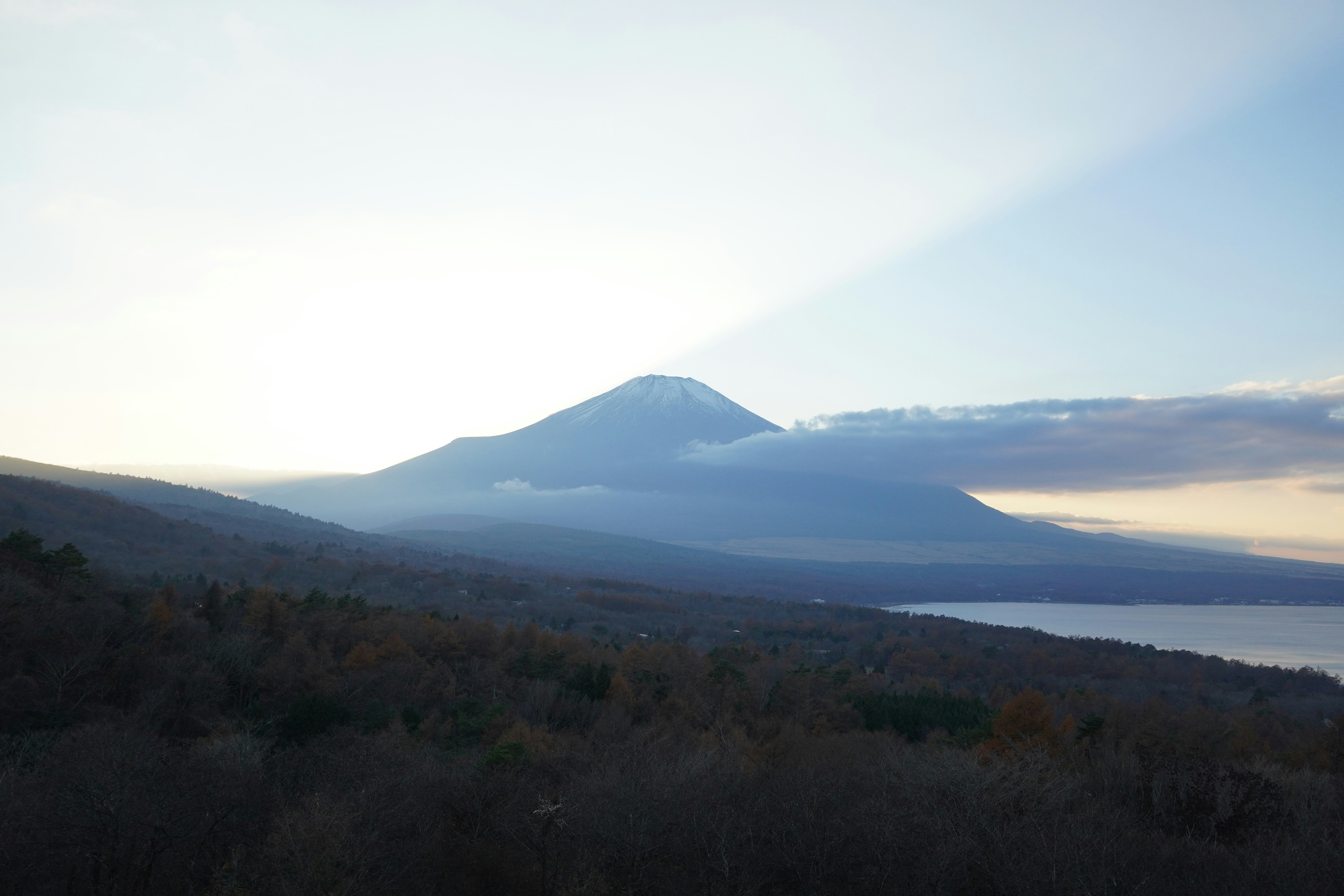 Silenced Peak: A Quiet Dawn Over a Moonlit Range