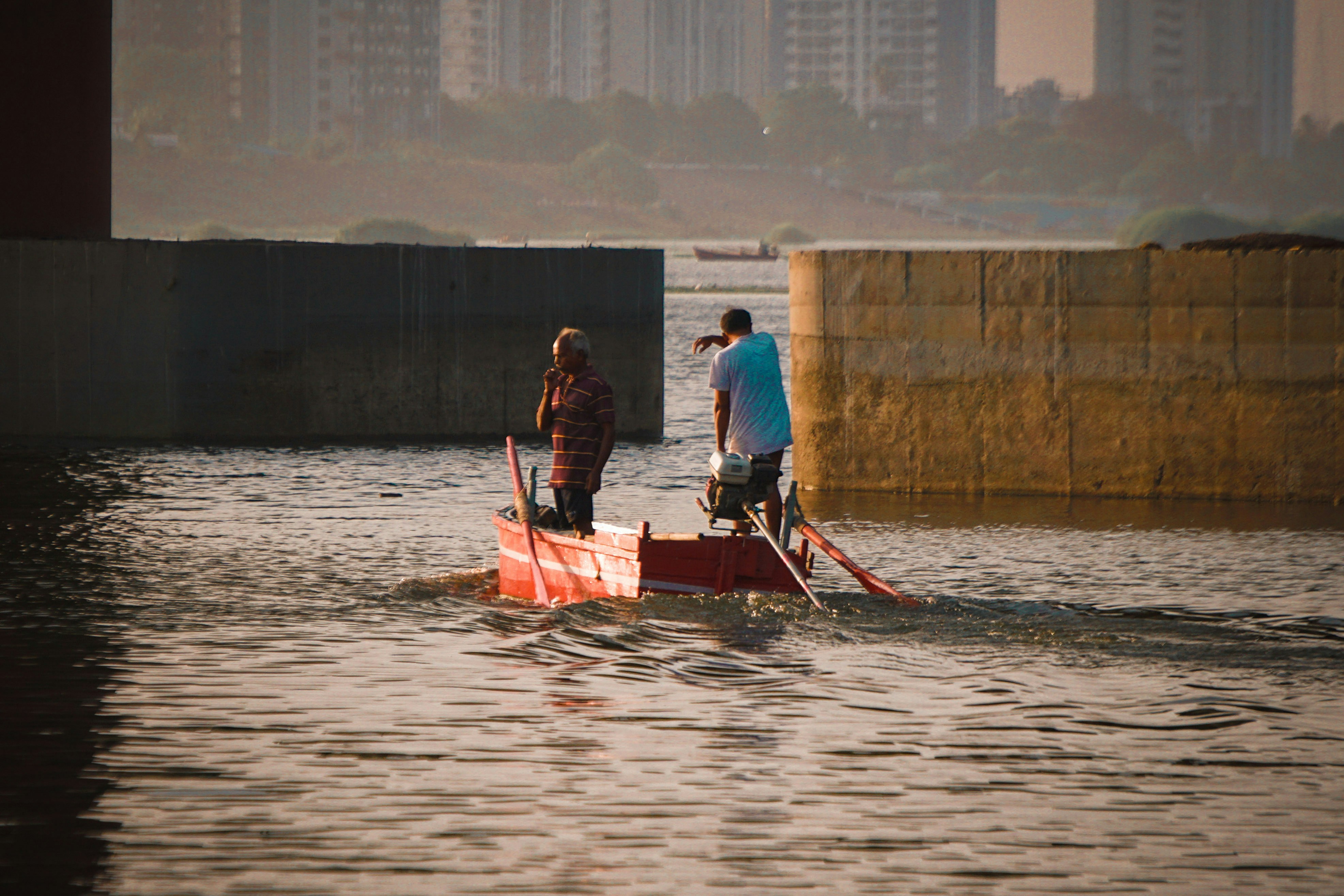 Red Boat Duo: A Sea-Entranced Harbor Moment