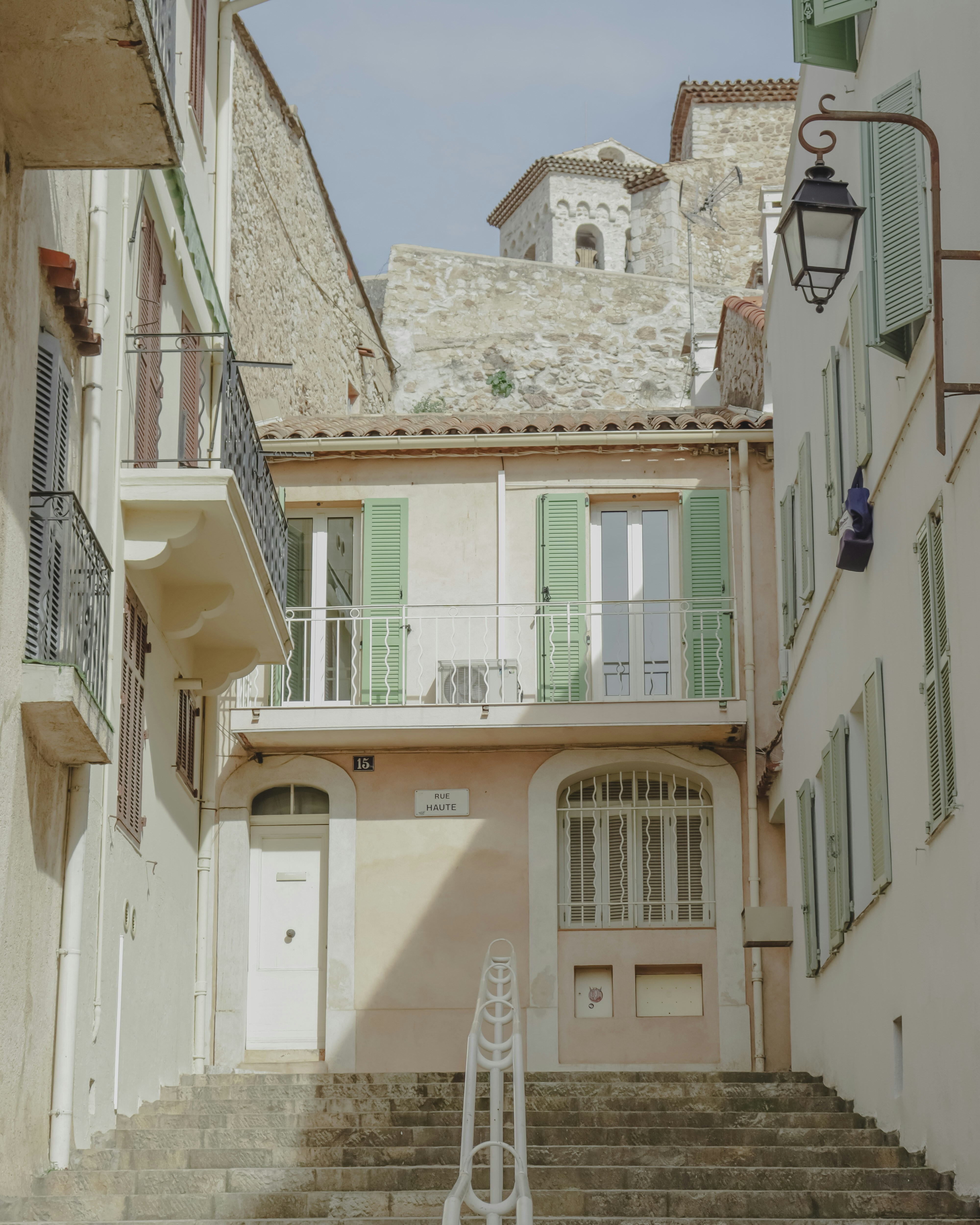 Sunlit Steps to a Quiet Courtyard