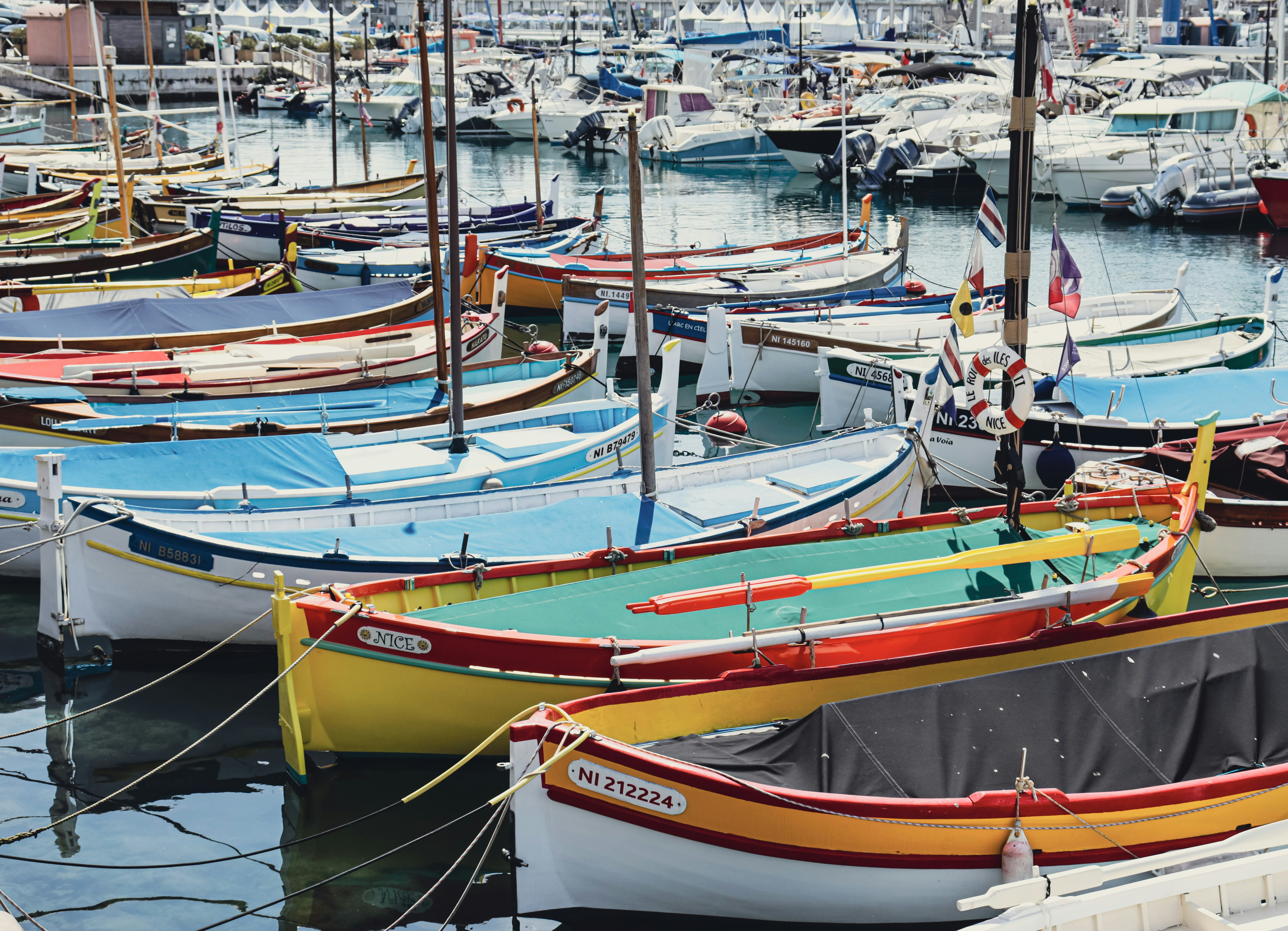 Colorful Boats at Rest: A Mosaic of Small Craft lining the Pier