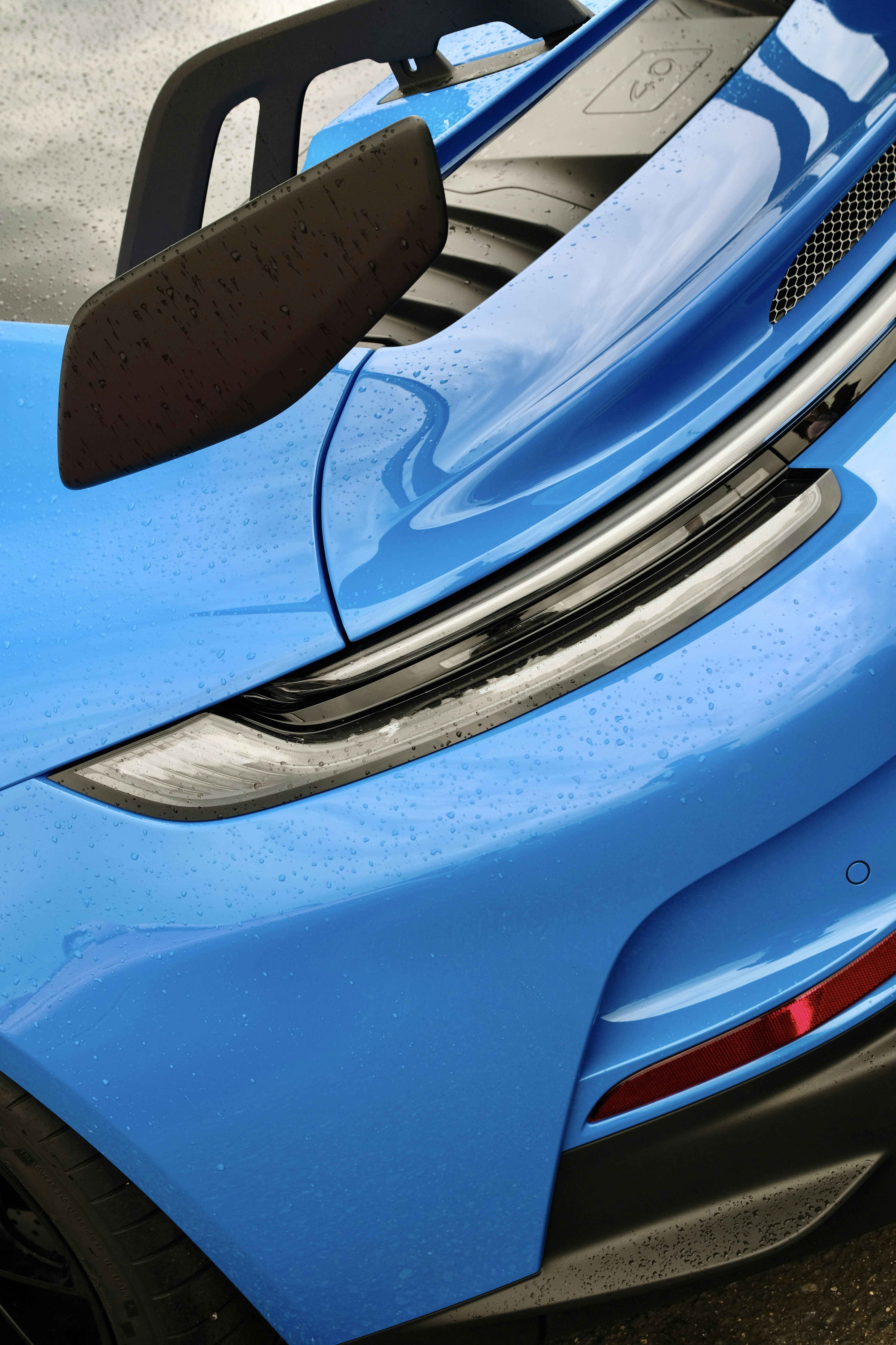 Blue Precision: Close-Up of the Front Mask and Hood Grille