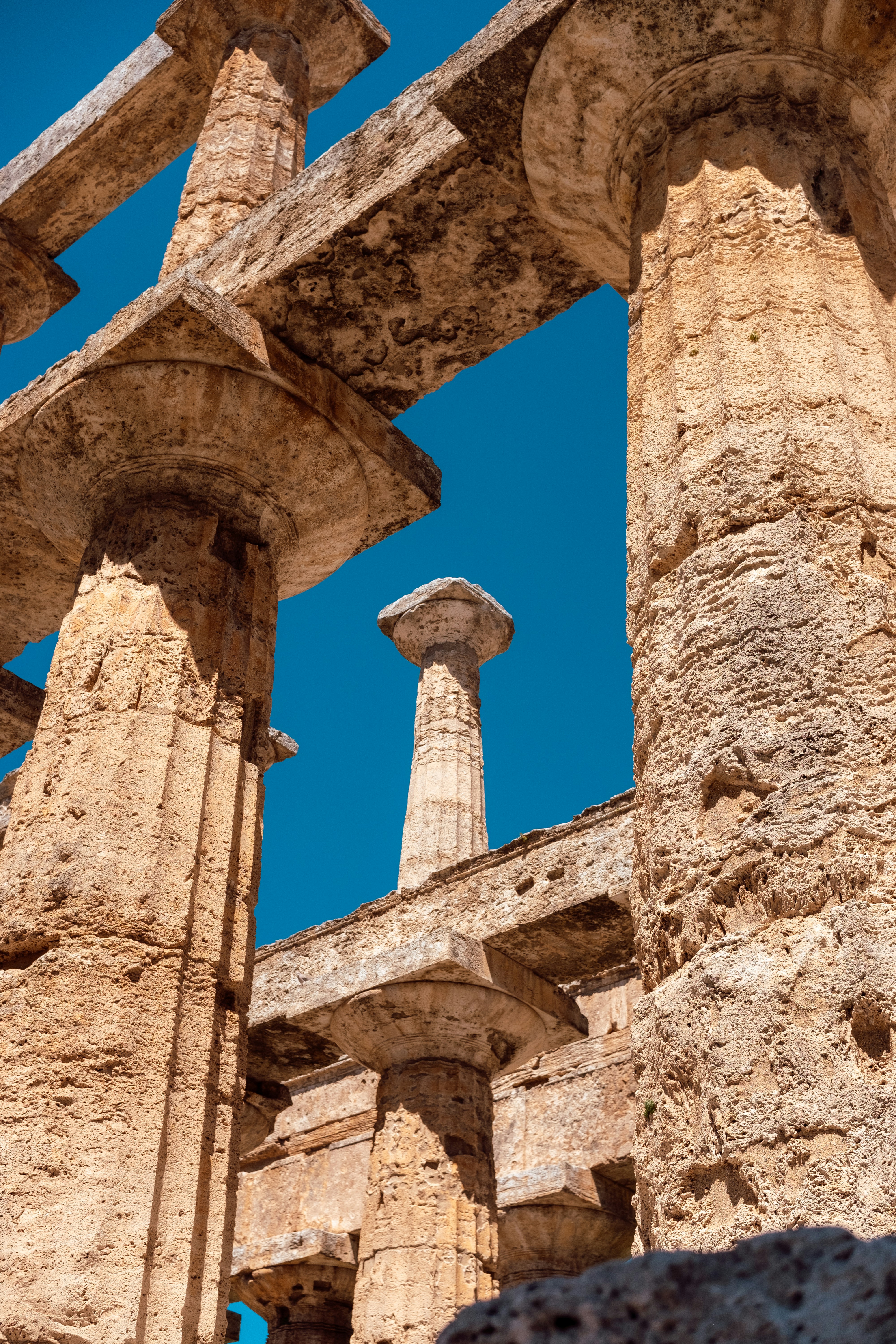 Ancient Columns: Skyward Courtyard of Weathered Stone