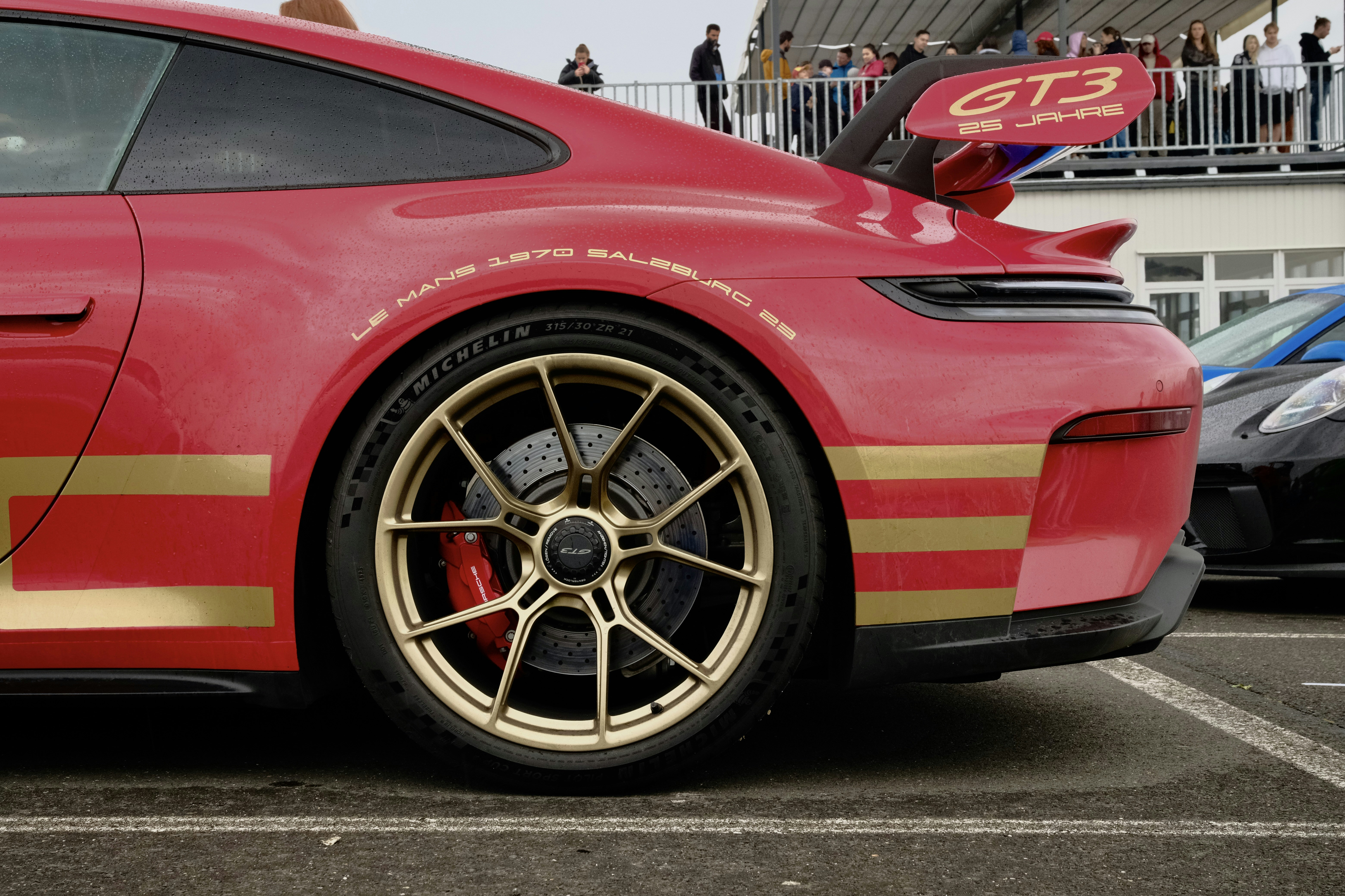 Gilded Performance: The Porsche Rearing in a Car Show