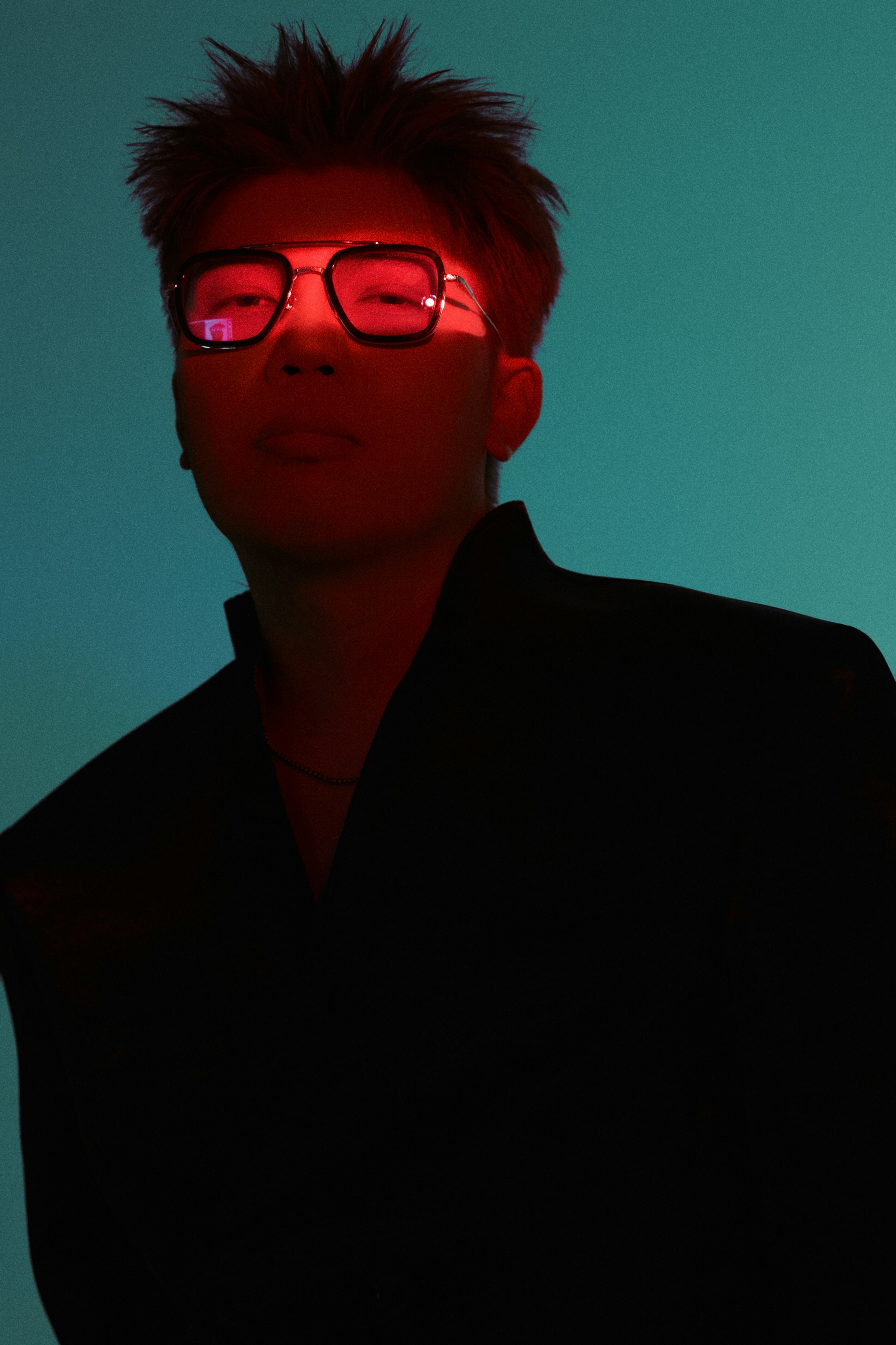 Neon Shadows: A Confident Silhouette in Red-Green Light