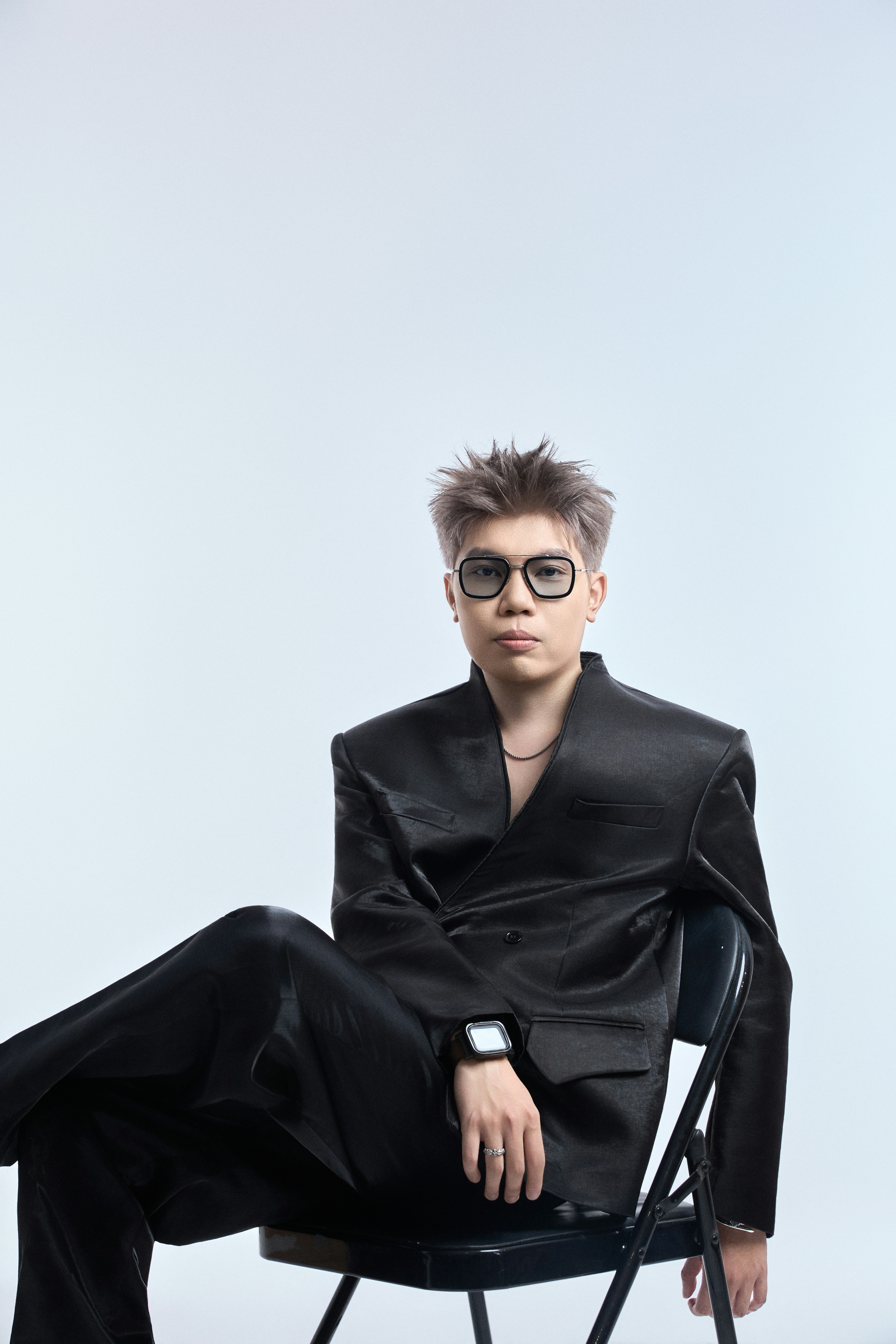 Bold Silence: A Shadowed Vision in a Sharp Black Suit