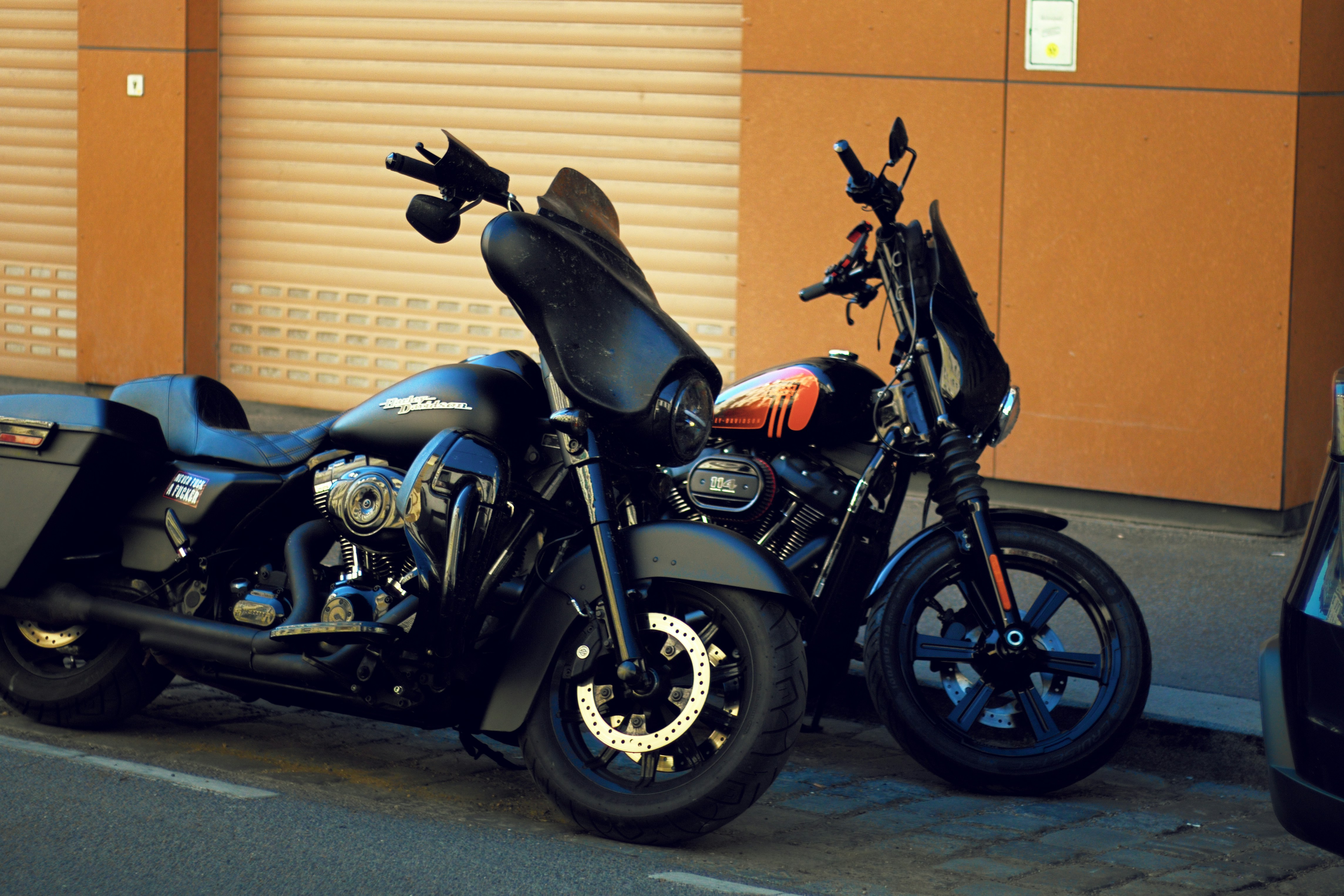 Midnight Geometry: A Pair of Urban Cruisers Resting by the Facade