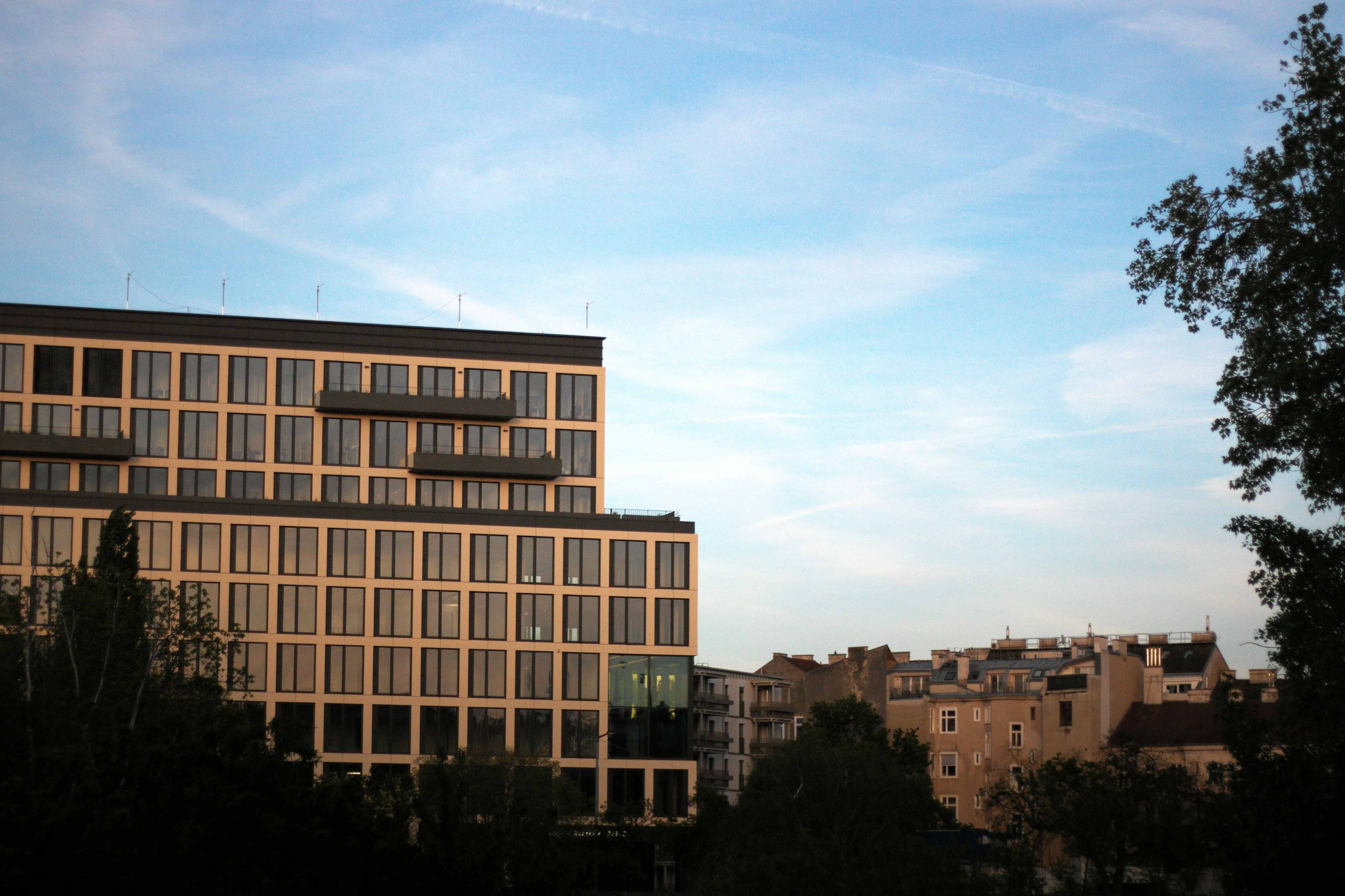Sunlit Modern Building at Dusked Horizon