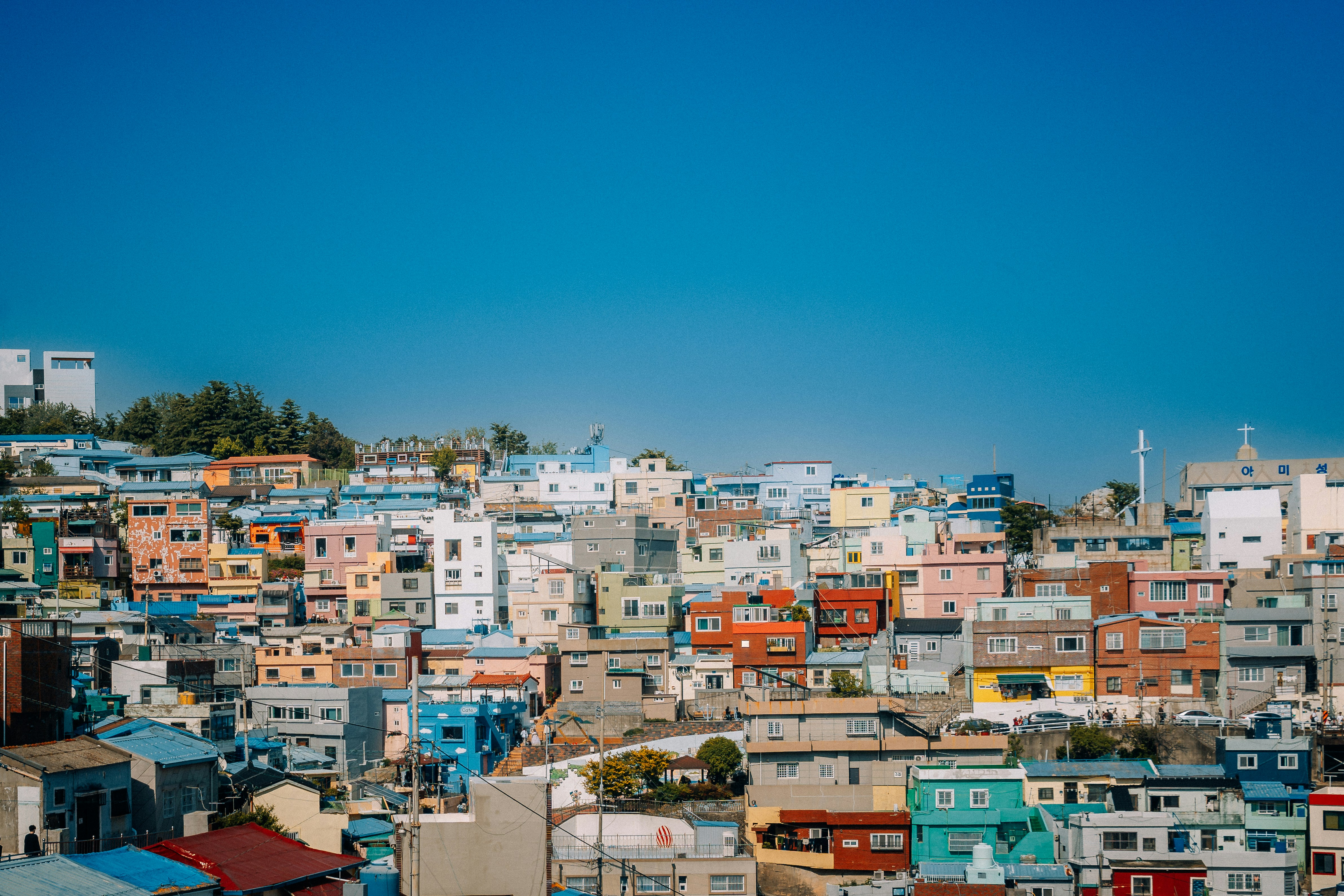 Colorful hillside village under a cobalt sky