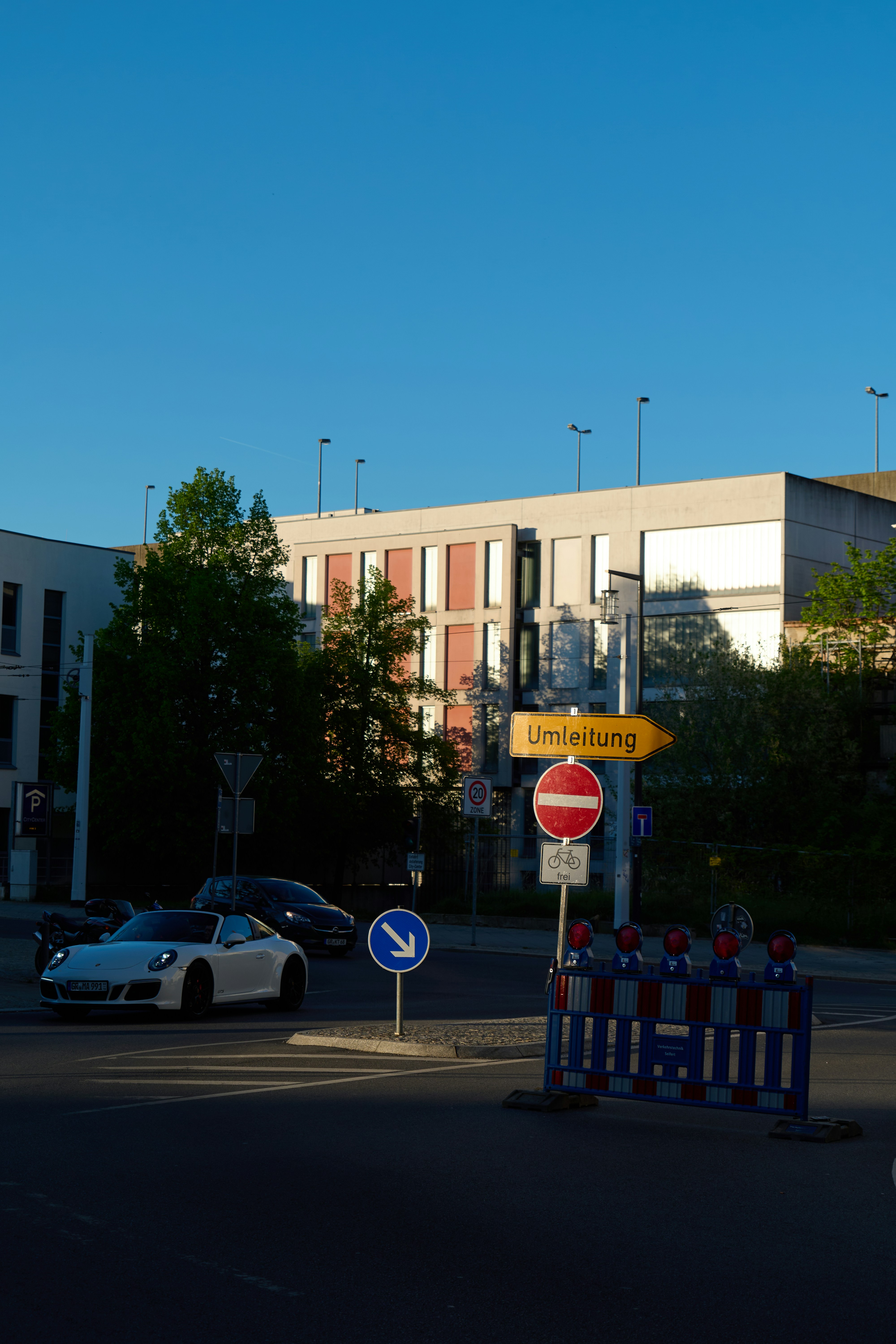 City Street Barrier and Signage at Twilight