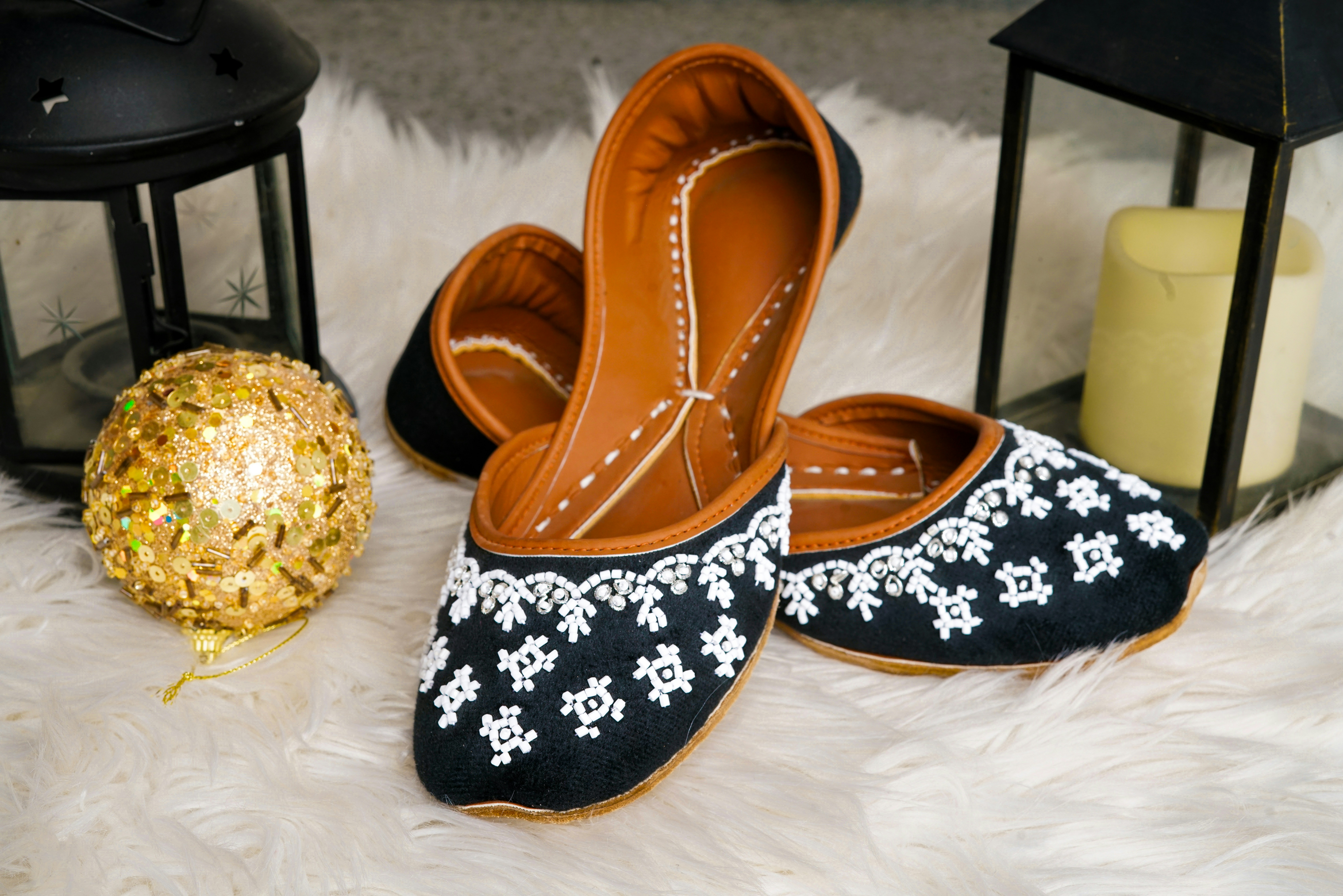 Embroidered Slippers on Plush Studio Floor