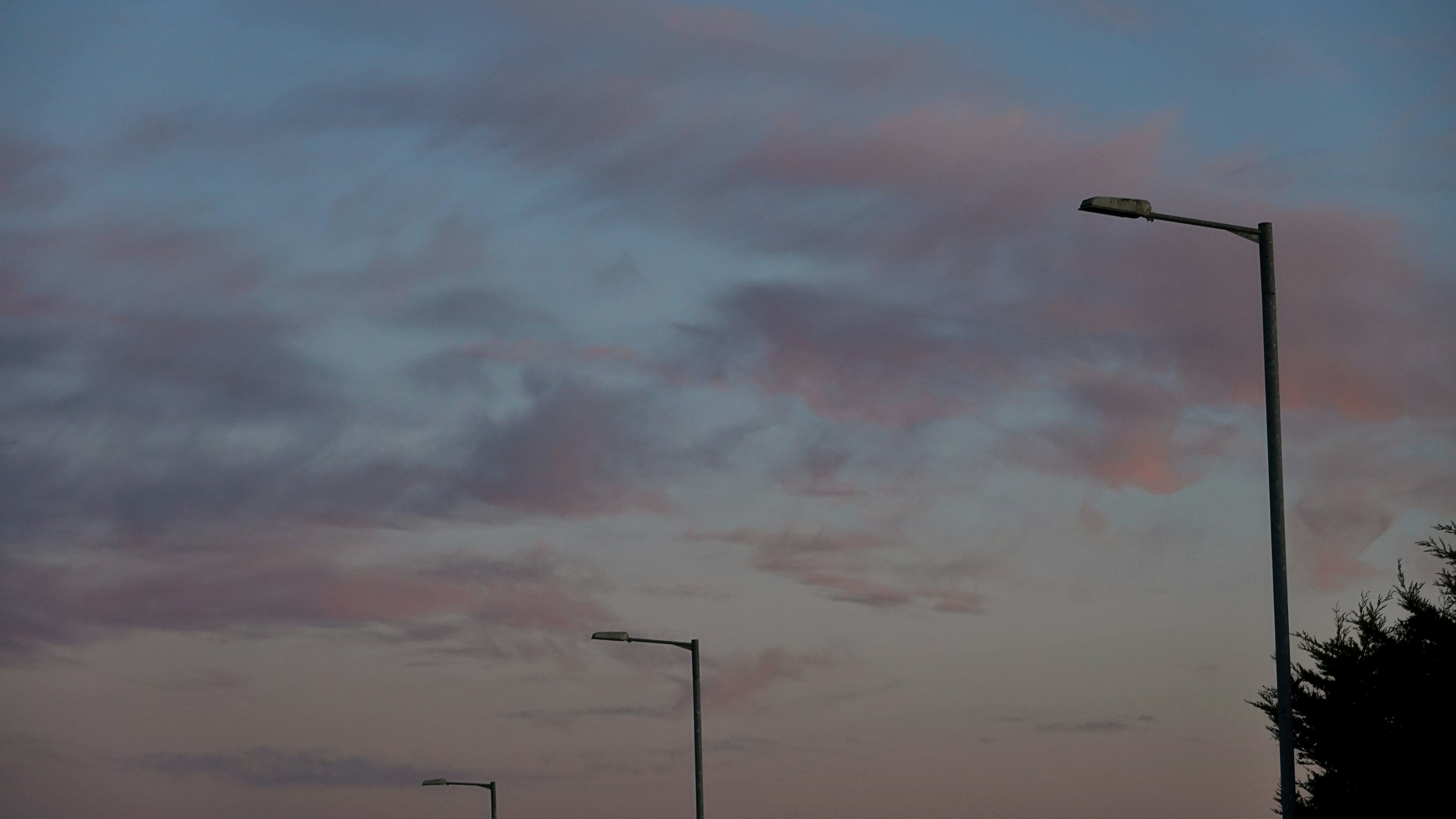 Evening Sky Over Quiet Streetlights