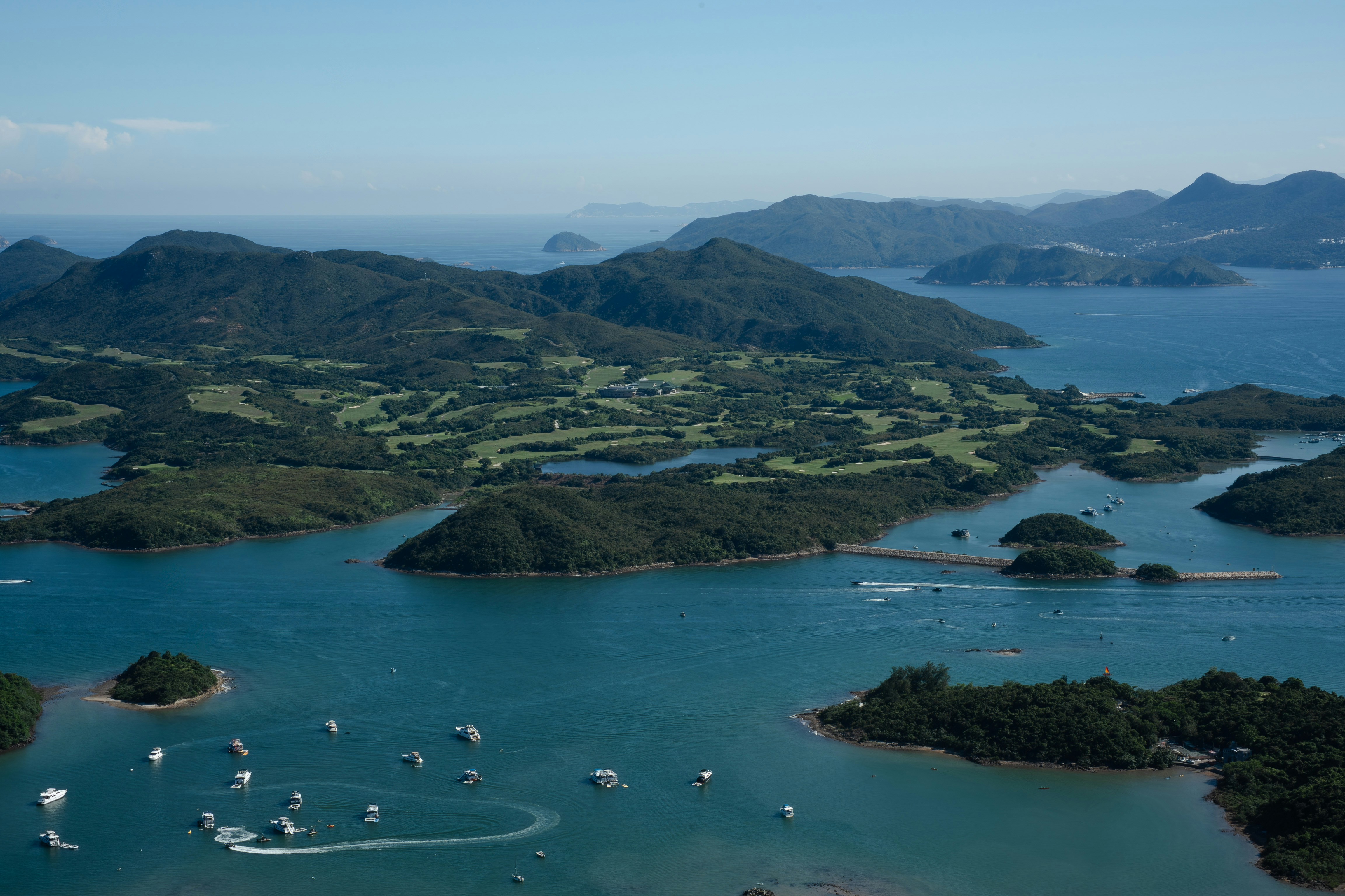 Islands in Calm Blue: A Drone View of Verdant Archipelago