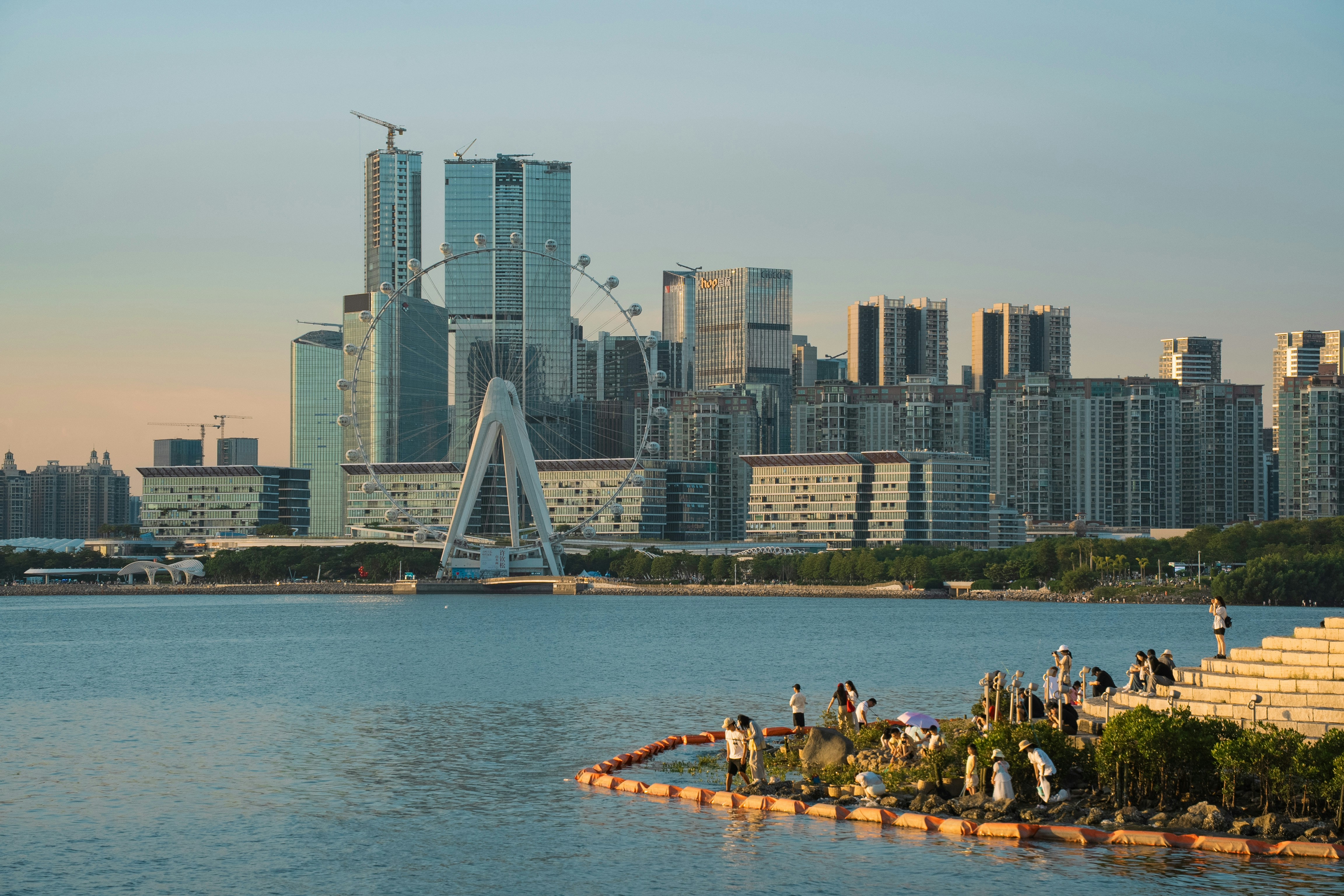 Urban Waterfront: Crescent of Light over a Modern Marina