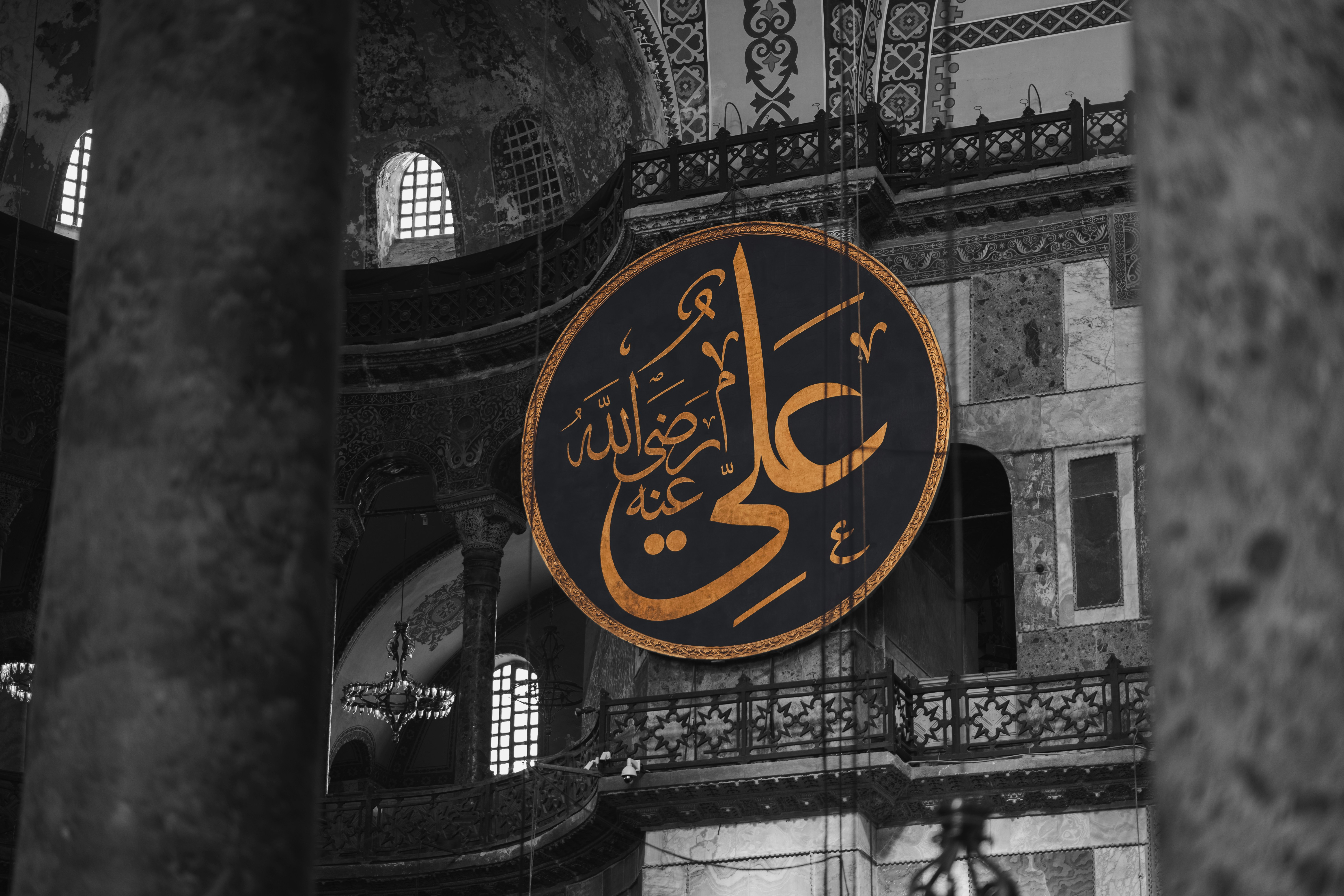 Emblem in Shadow: A Monochrome Shrine with Golden Script