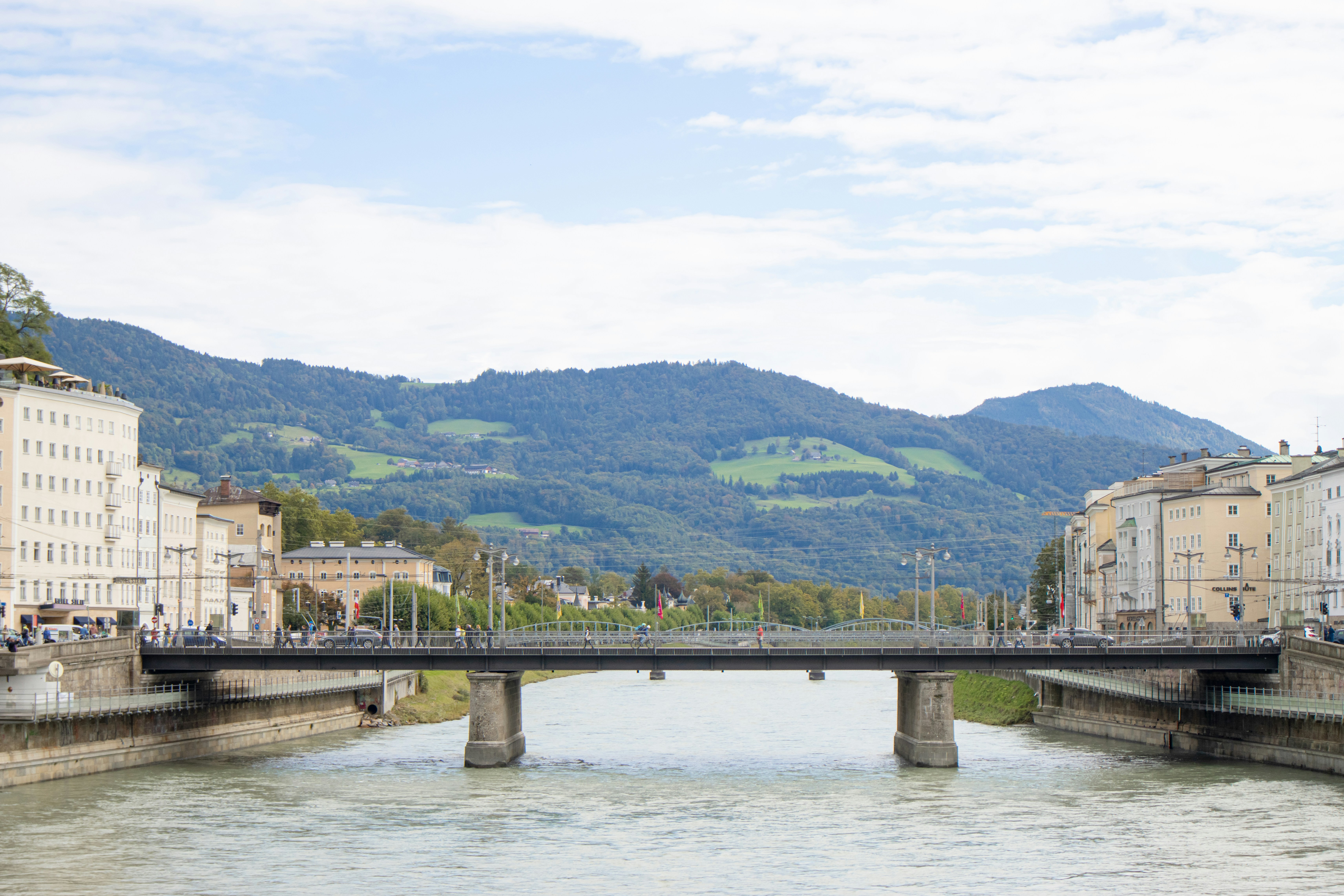 Quiet City by the River: Symmetry of Bridges and Dawn Hills