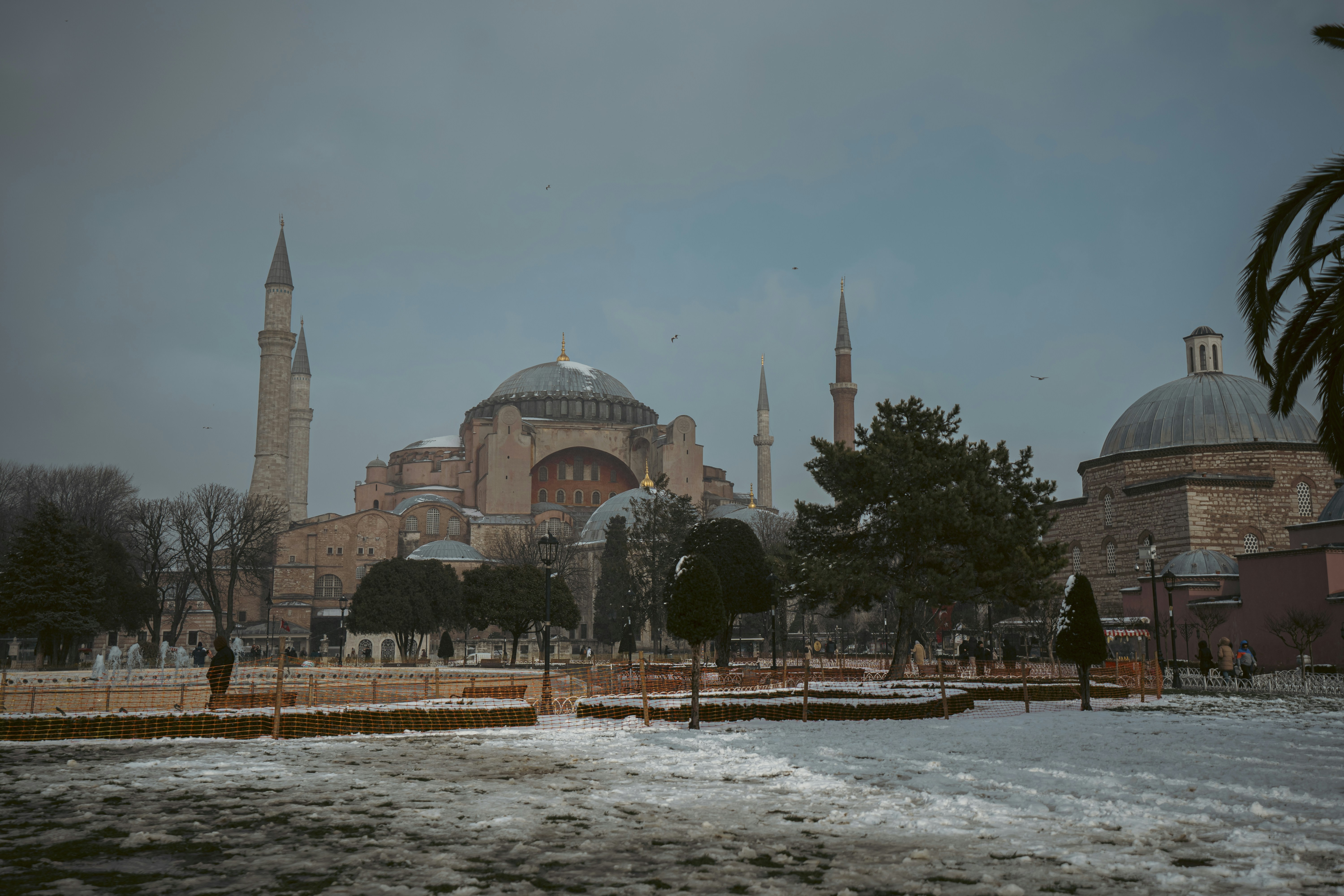 Istanbul silhouettes: domes and minarets under a pale winter sky
