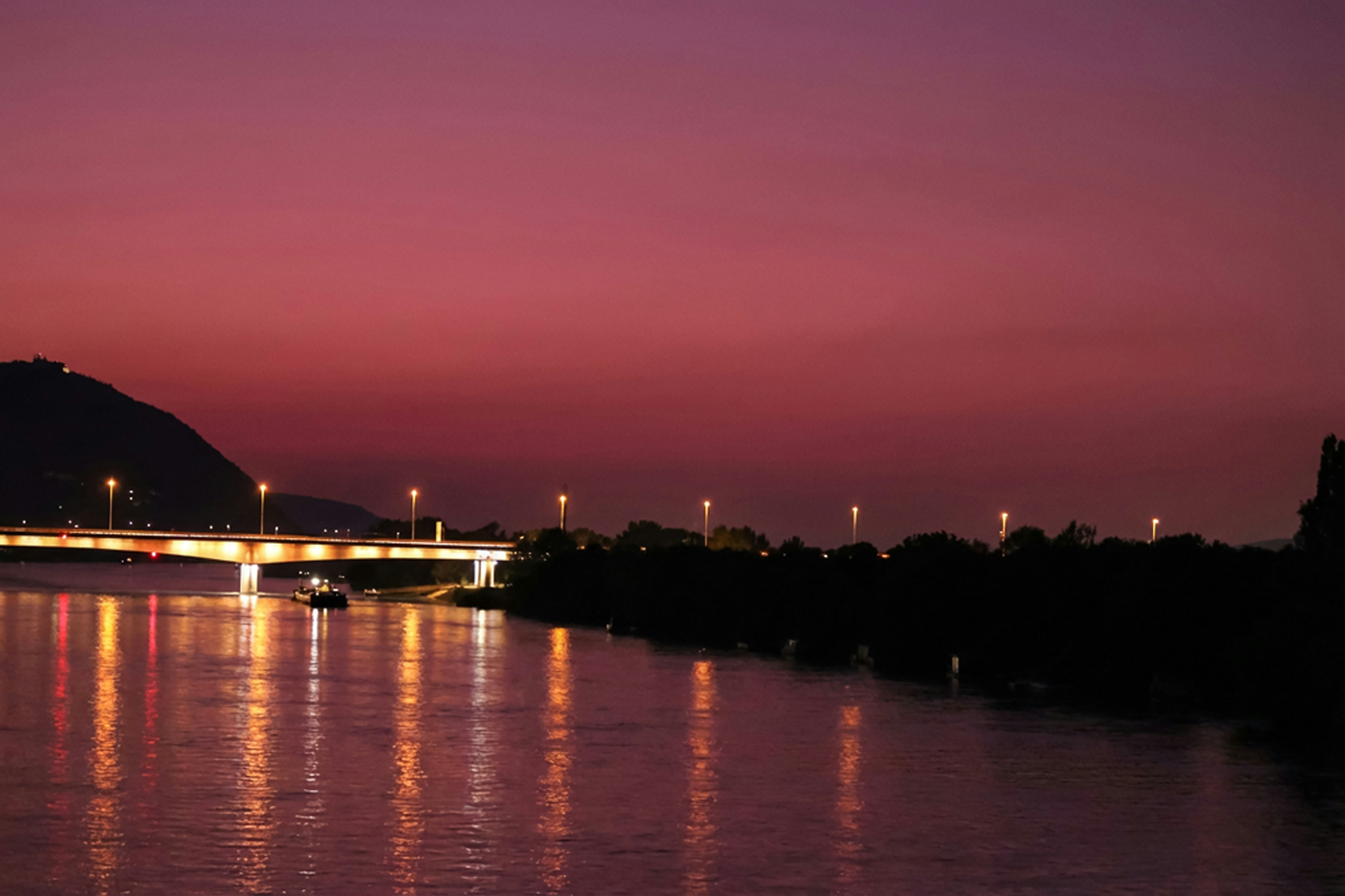 Evening River Lights: A Quiet Dusk Over the Bridge