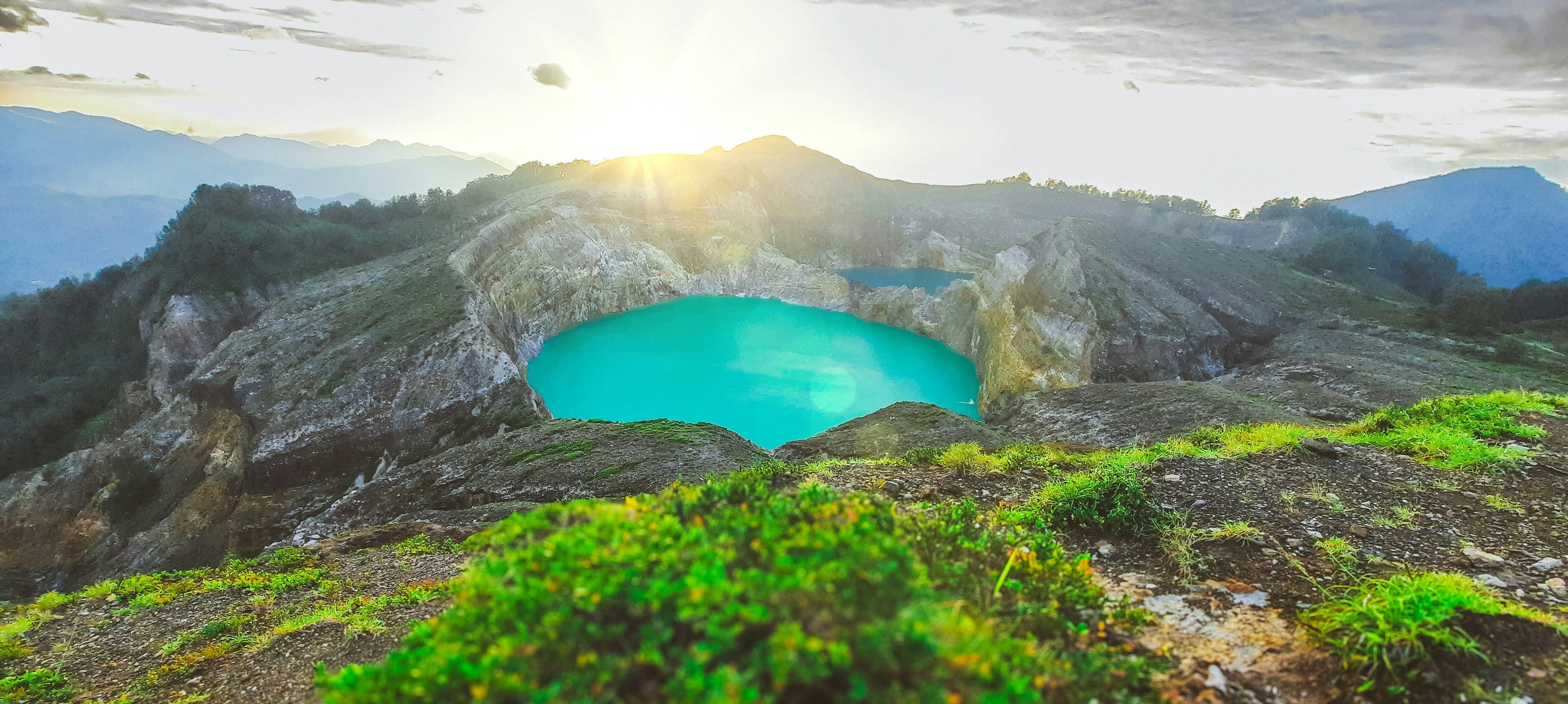 Emerald Crater at Dawn: A Hidden Lake in Volcanic Rings