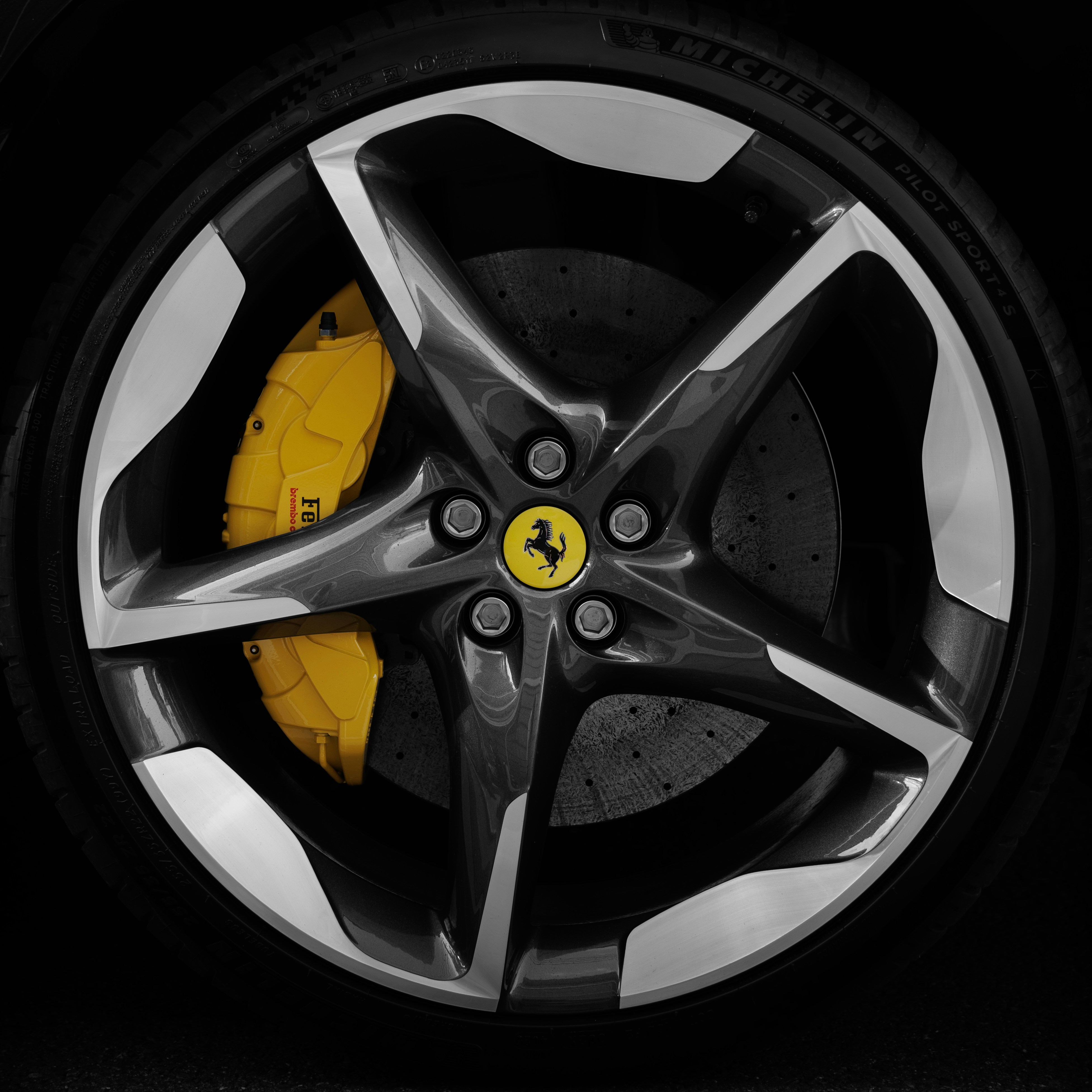 Lightning Yellow Brake Caliper Framed by Satin Alloy Rims