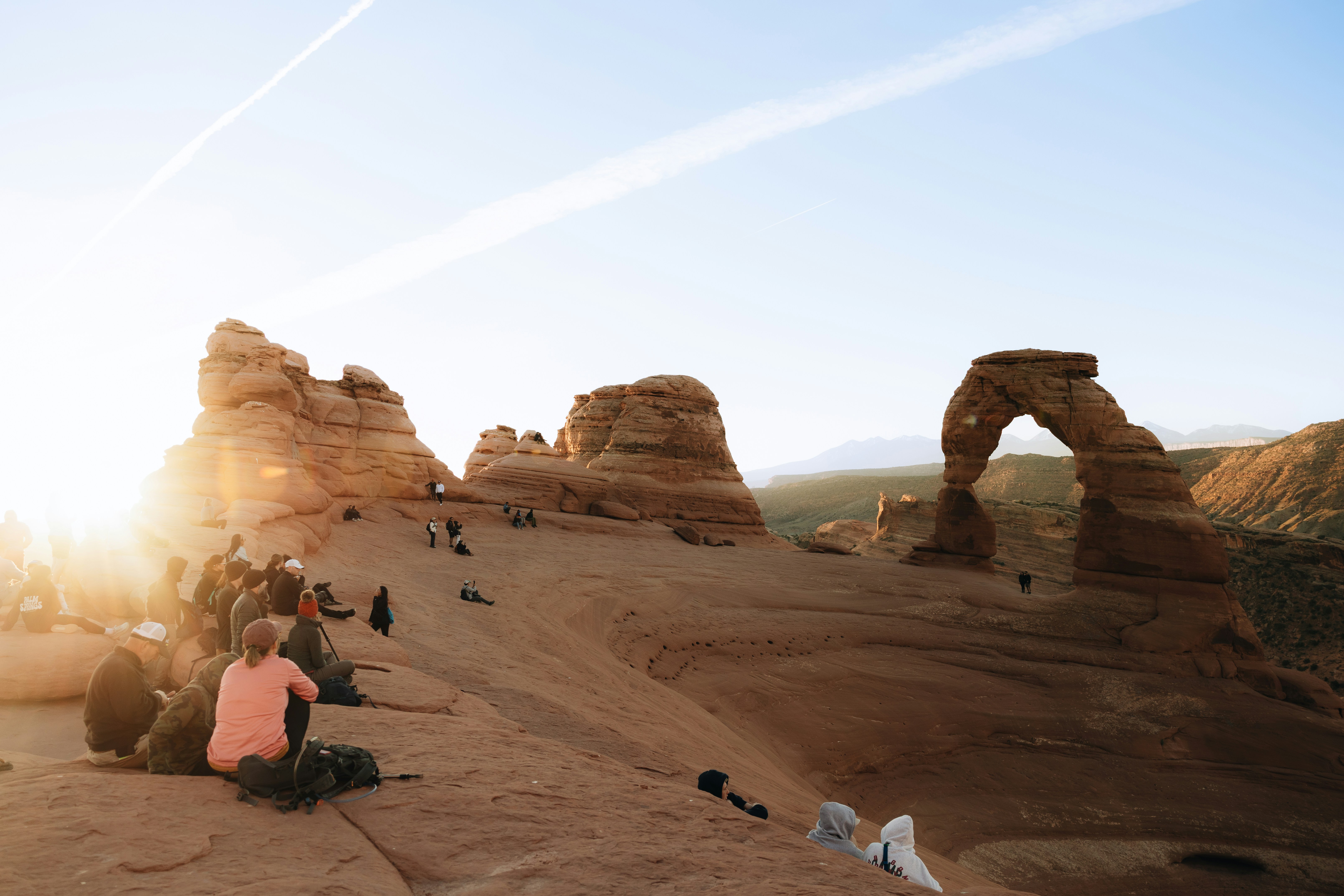 Evening Light Over the Arches: People Gather at Sunrise Point