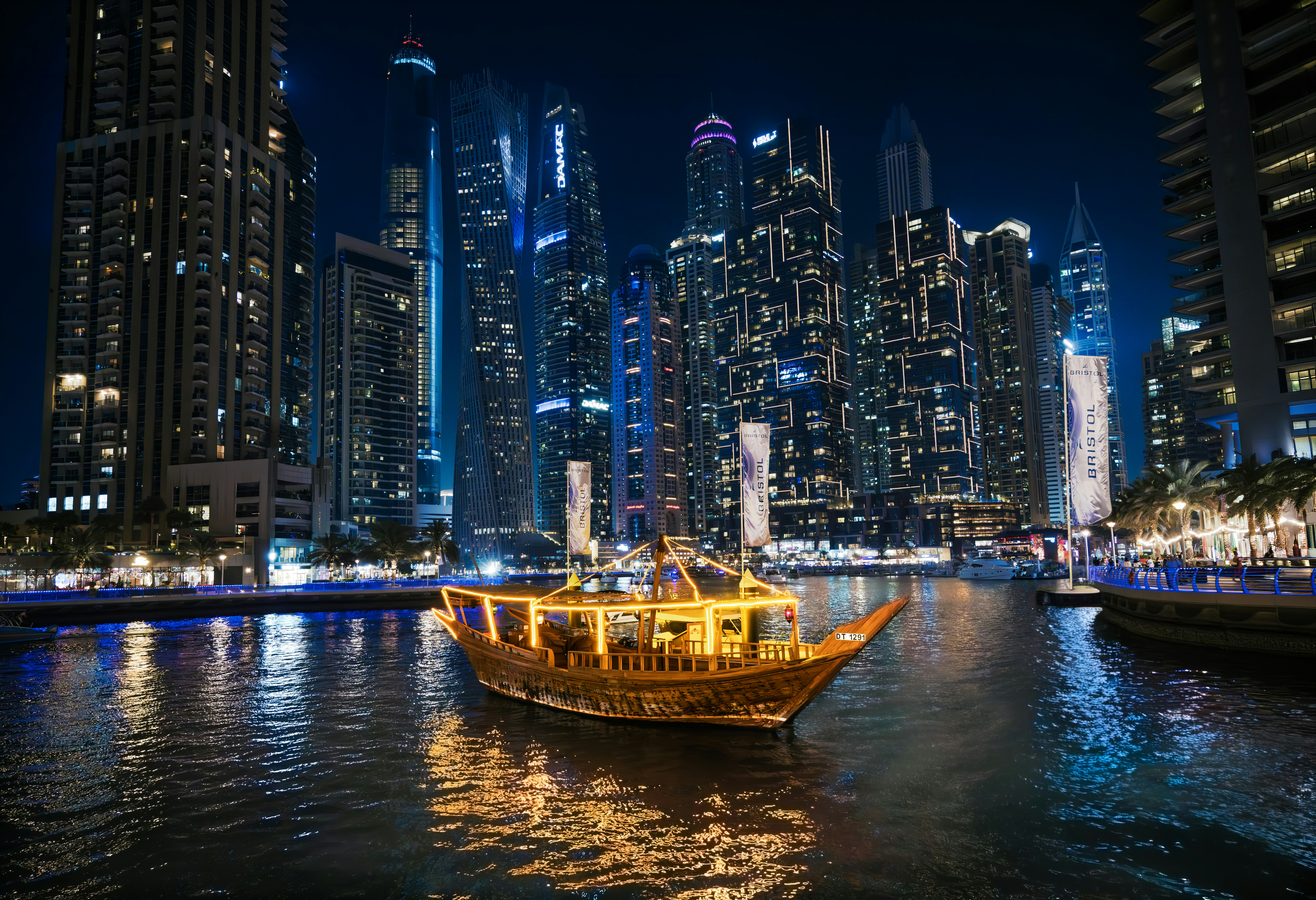 Glowing Nile of Glass: Lantern Boat Amid Skyscraper Reflections