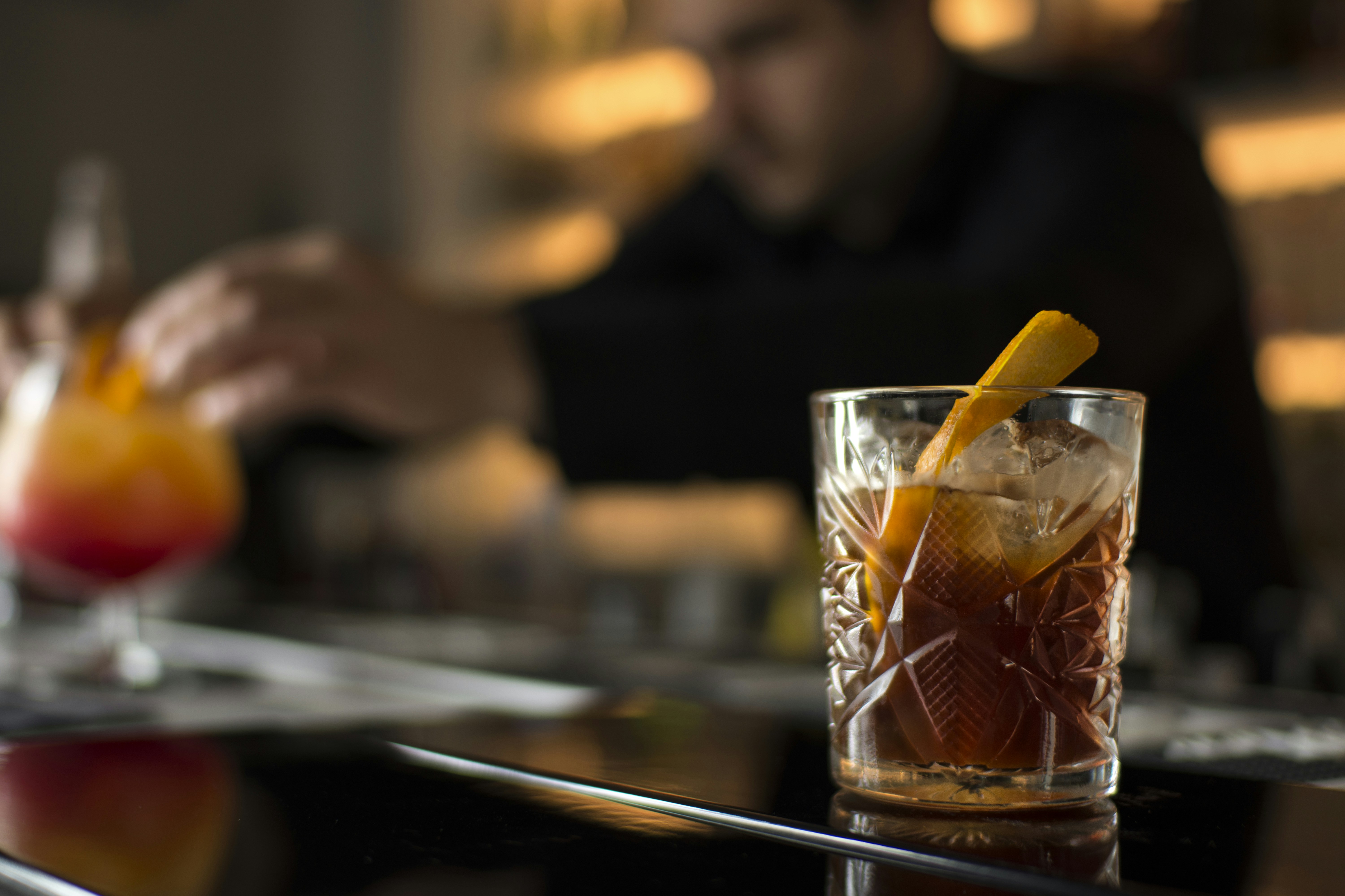 Amber Whispers at the Bar: A Crystal-Glazed Old Fashioned