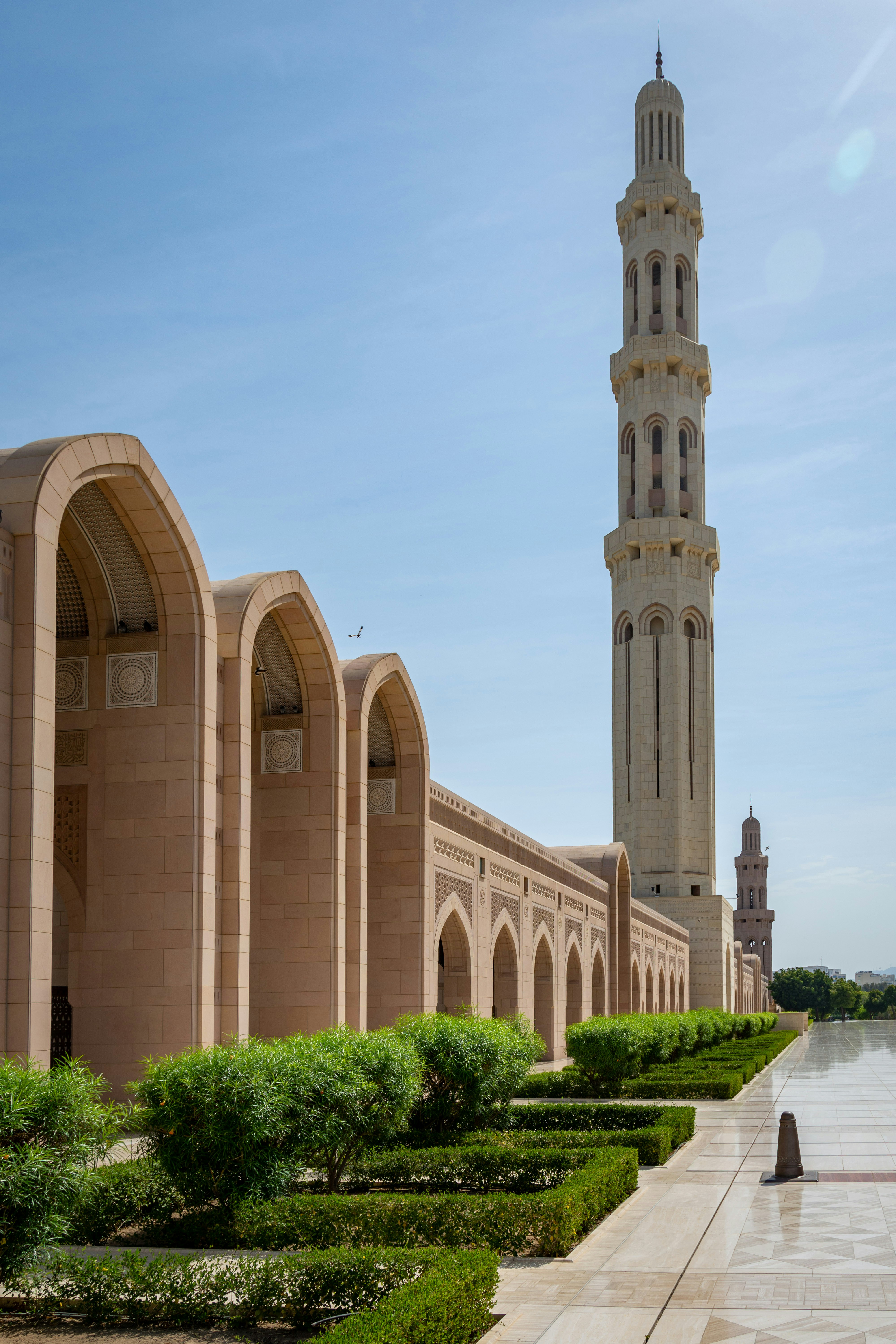 Minaret Rising Over Timbered Arches: A Courtyard Cathedral of Light