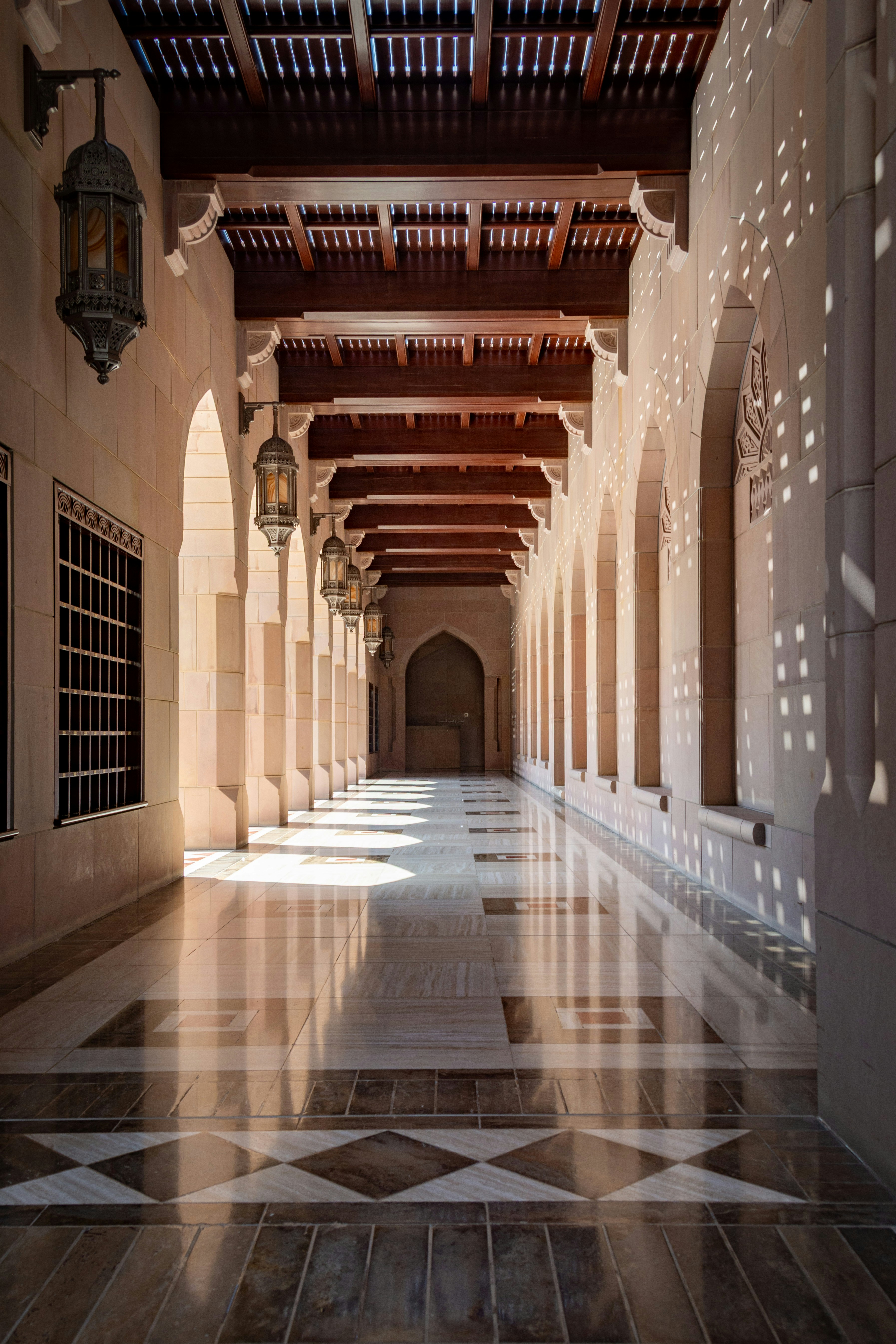 Sunlit Arcade: Repeating Arches and Lattice Shadows