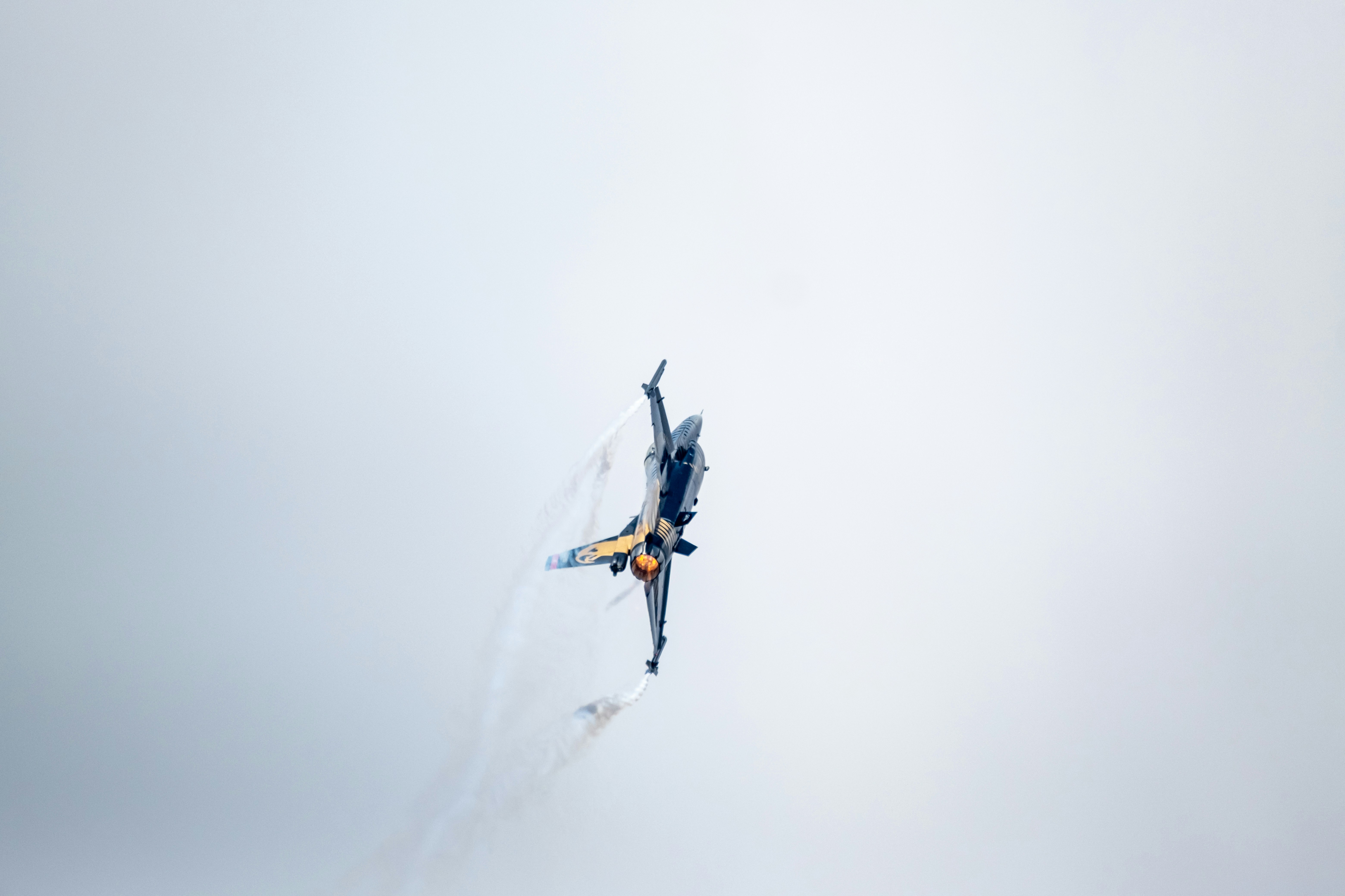 Jet Thrill: Aeriated Acrobat Climbing Through Silence