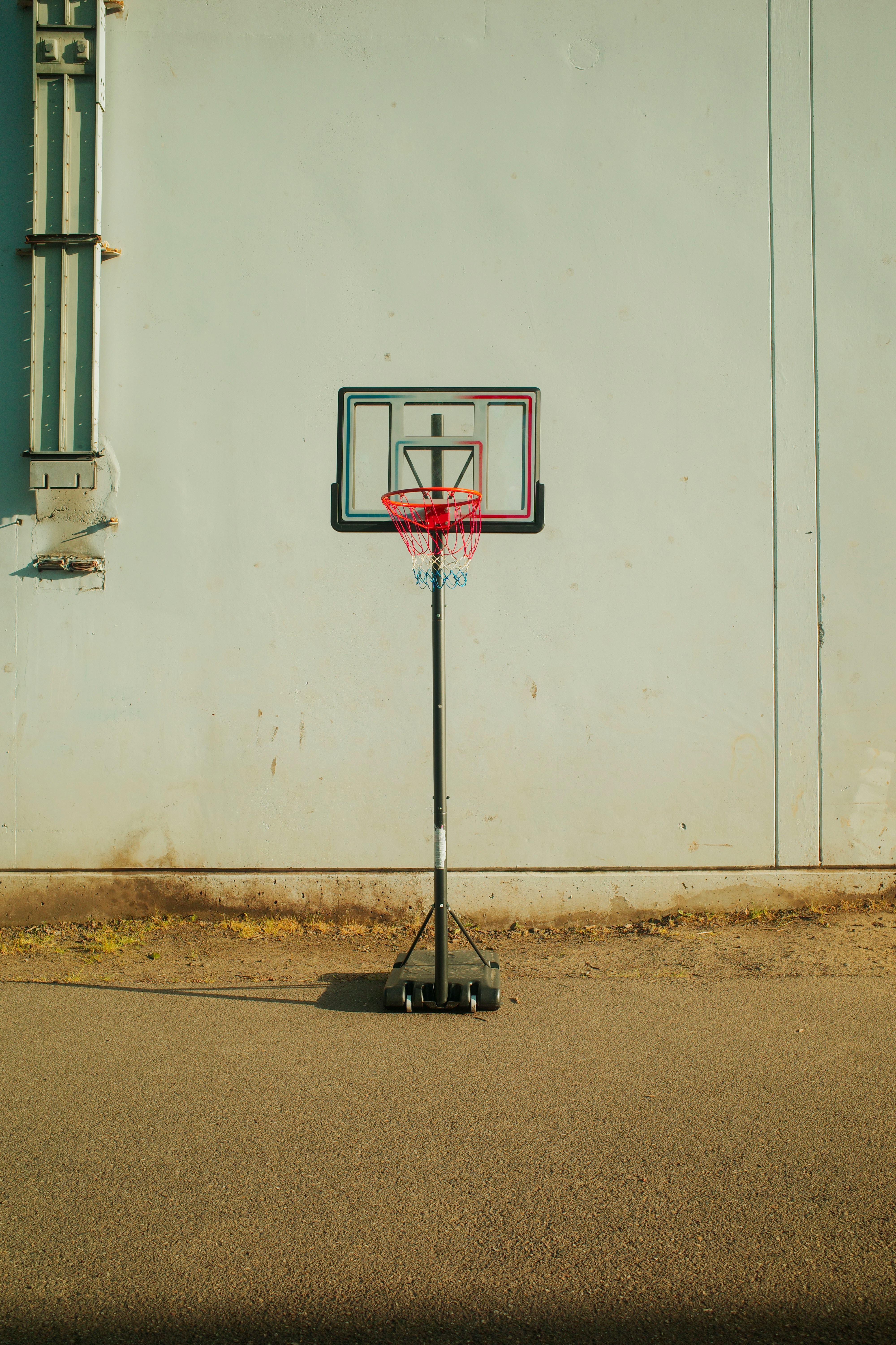 Portable Hoop Stands Its Ground on a Quiet Court