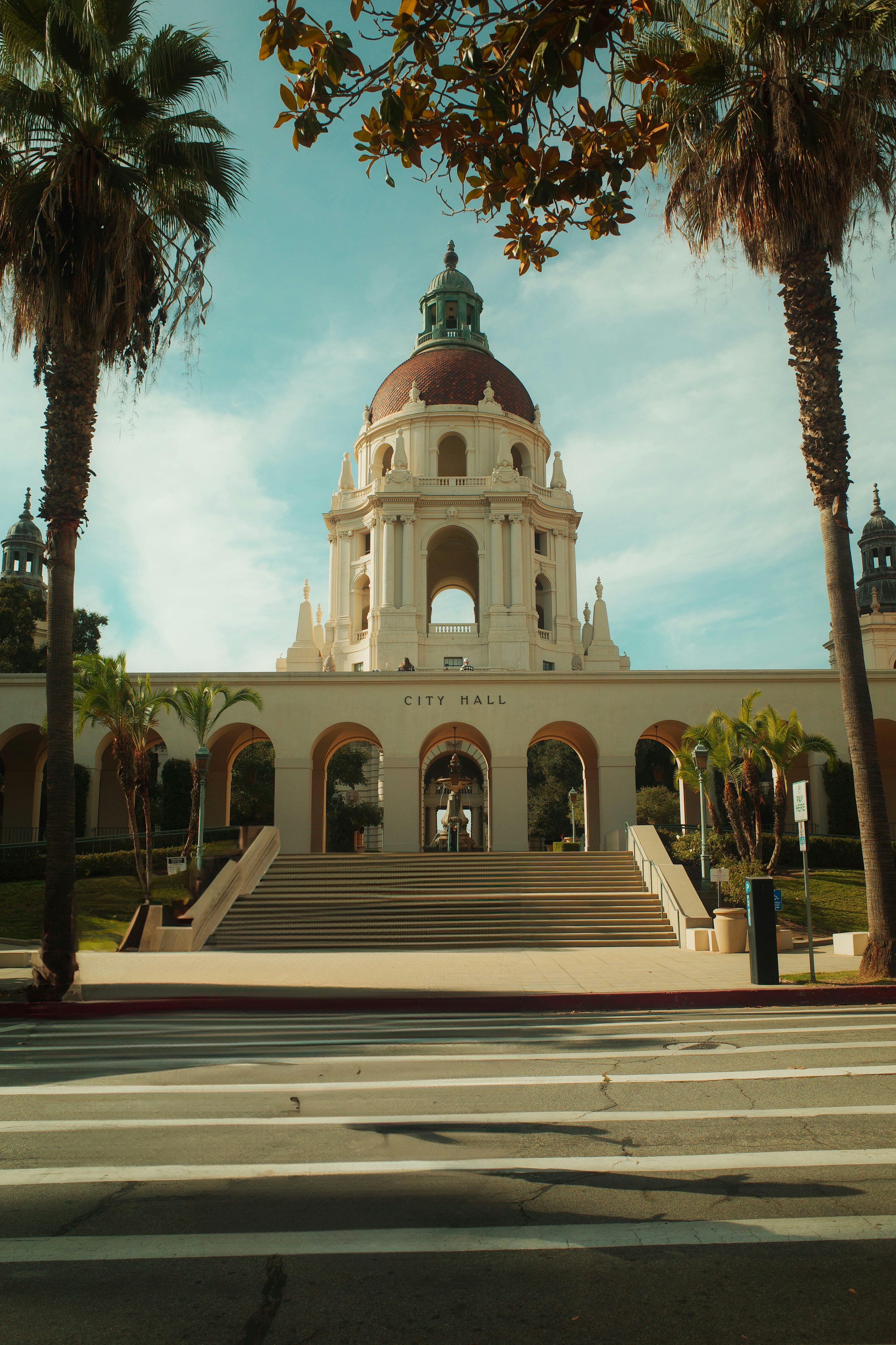 Sunlit City Hall Tower Framed by Palms