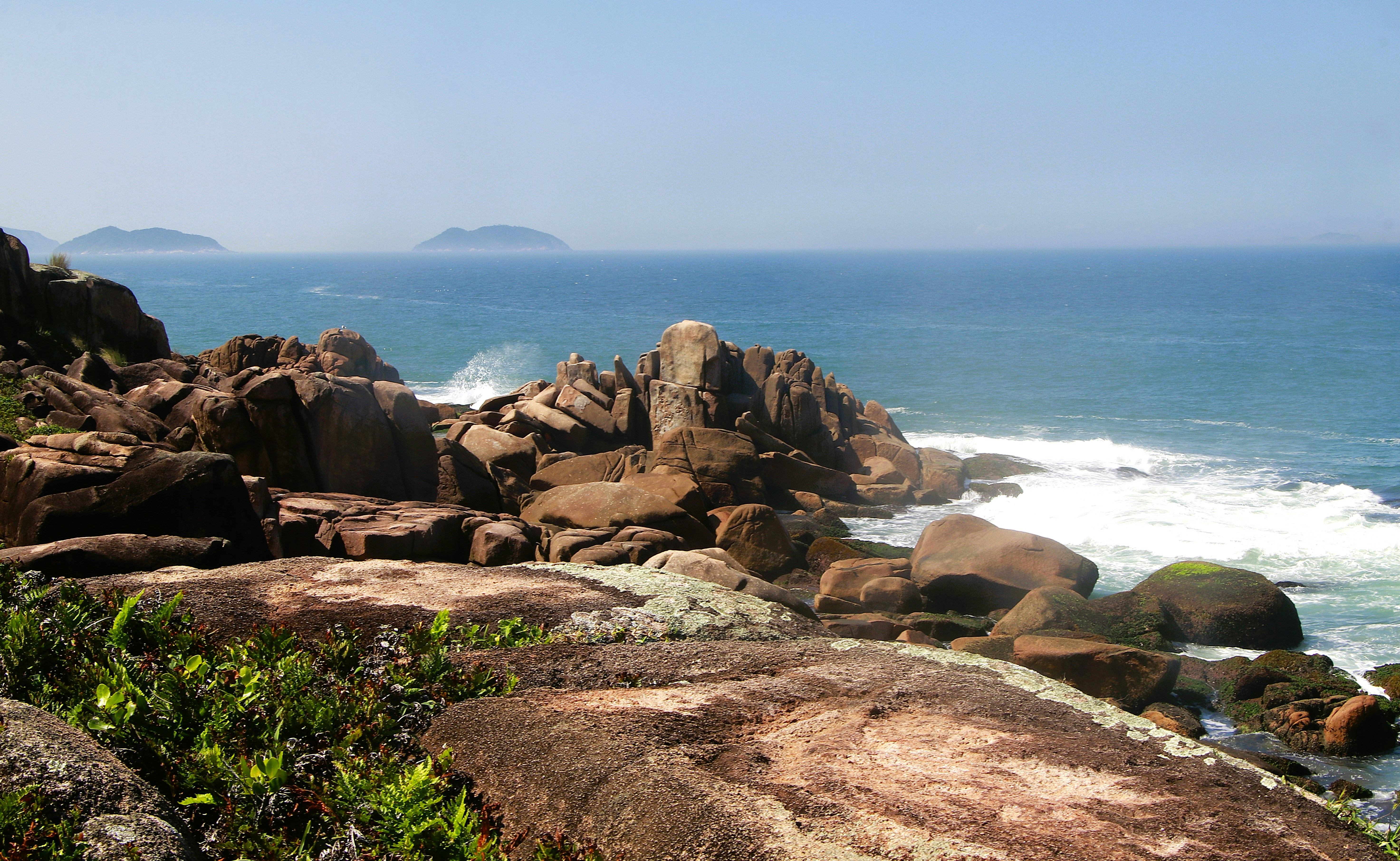 Coastal Granite: Morning Light on Weathered Rocks and Quiet Sea