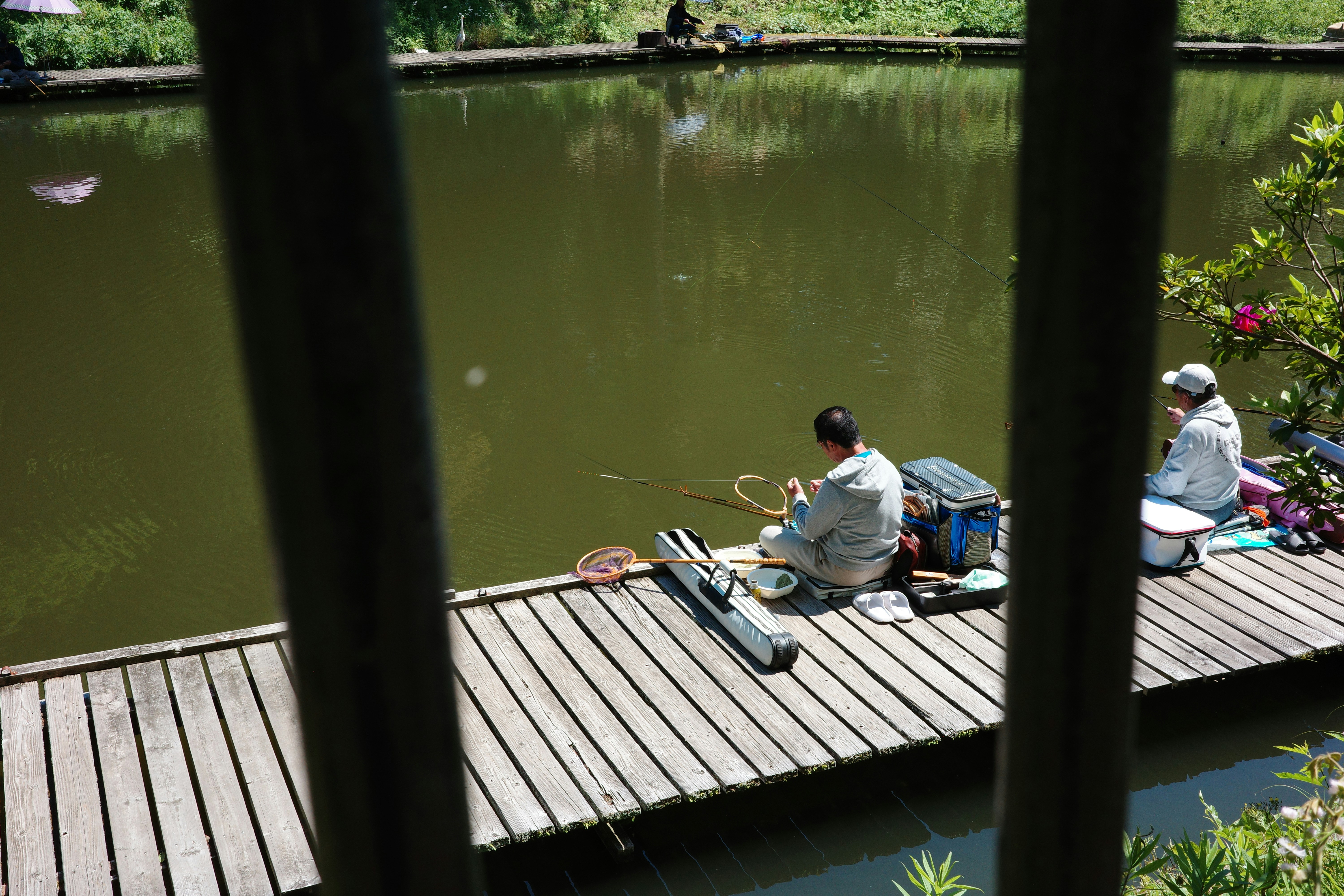 Dockside Dialogue: Fishermen at Quiet Pond