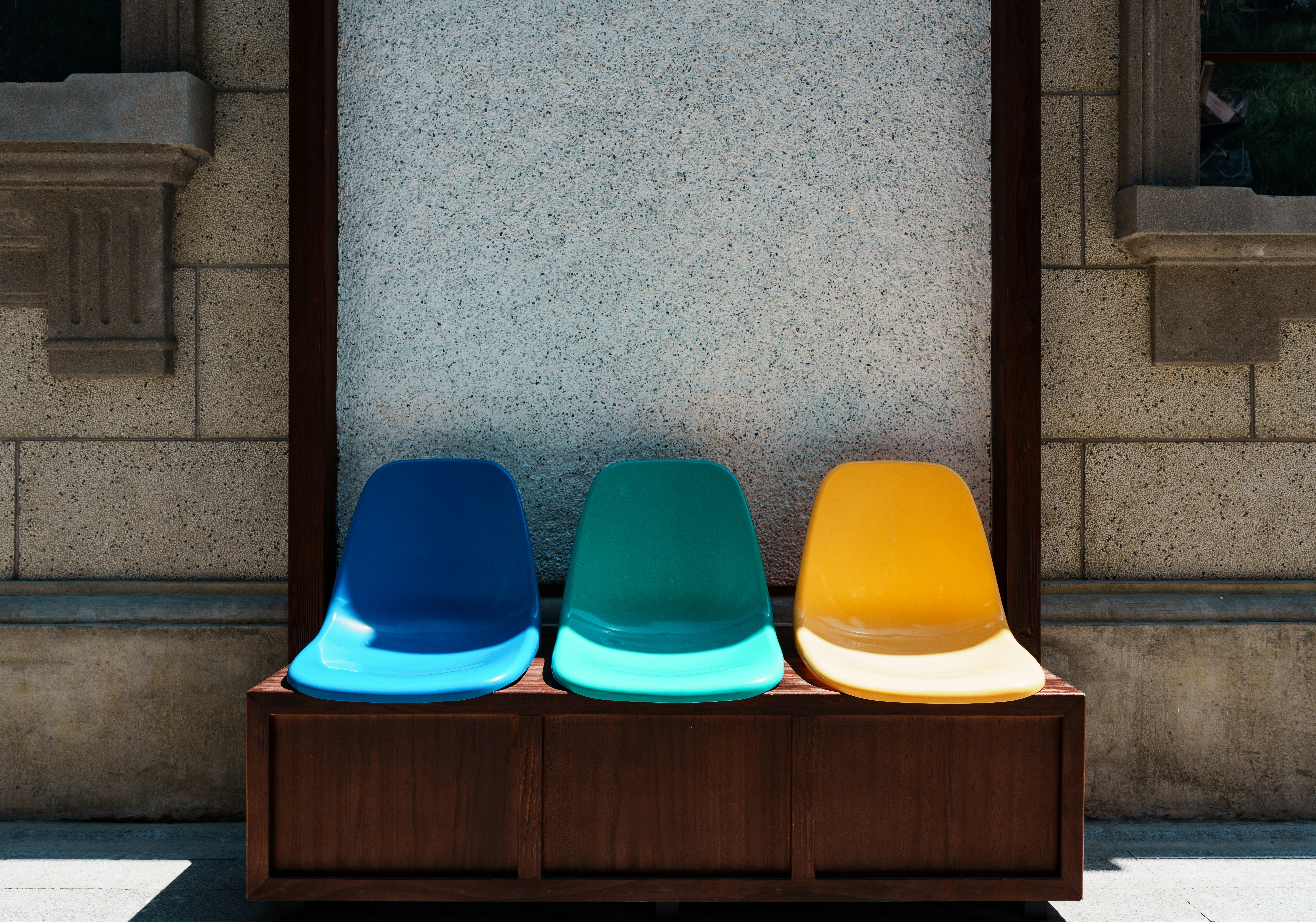 Three Chairs, One Row: A Quiet Palette in Urban Stone