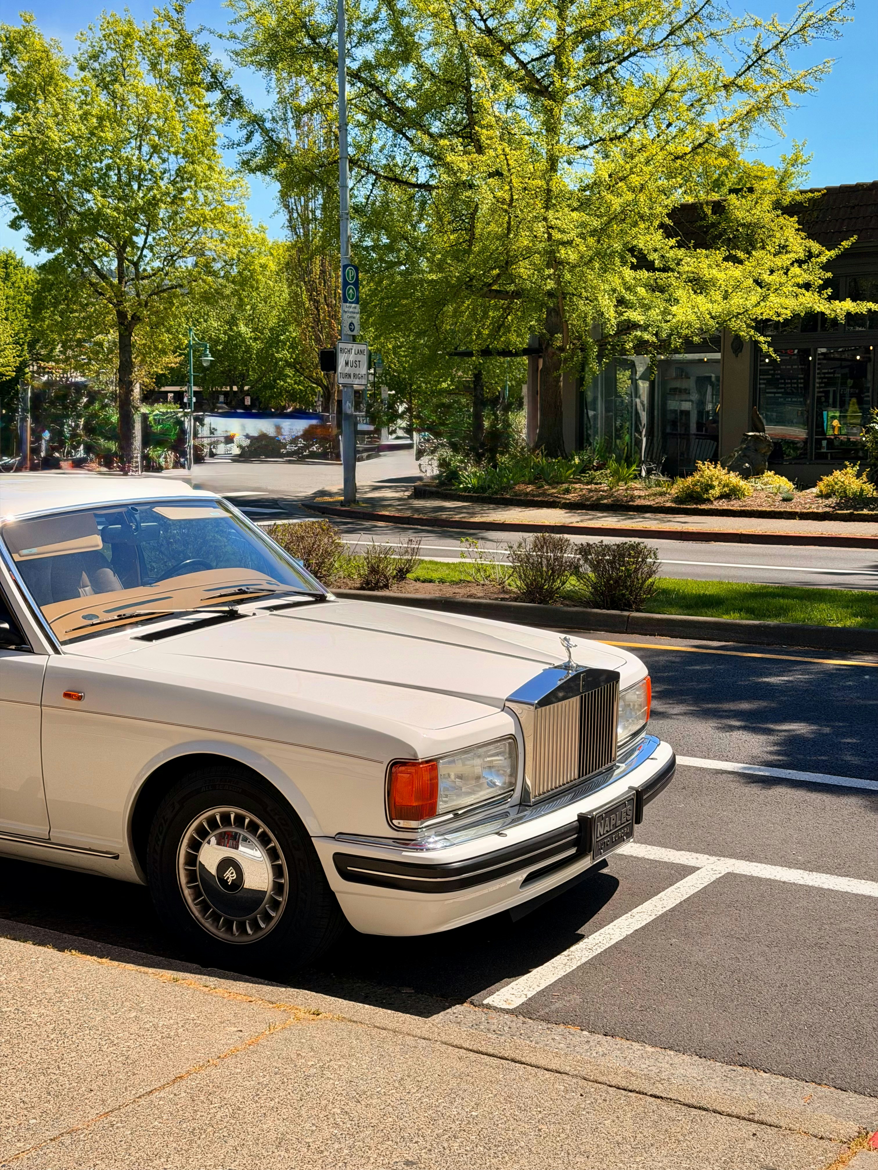 Cream Classic in a Sunlit Street