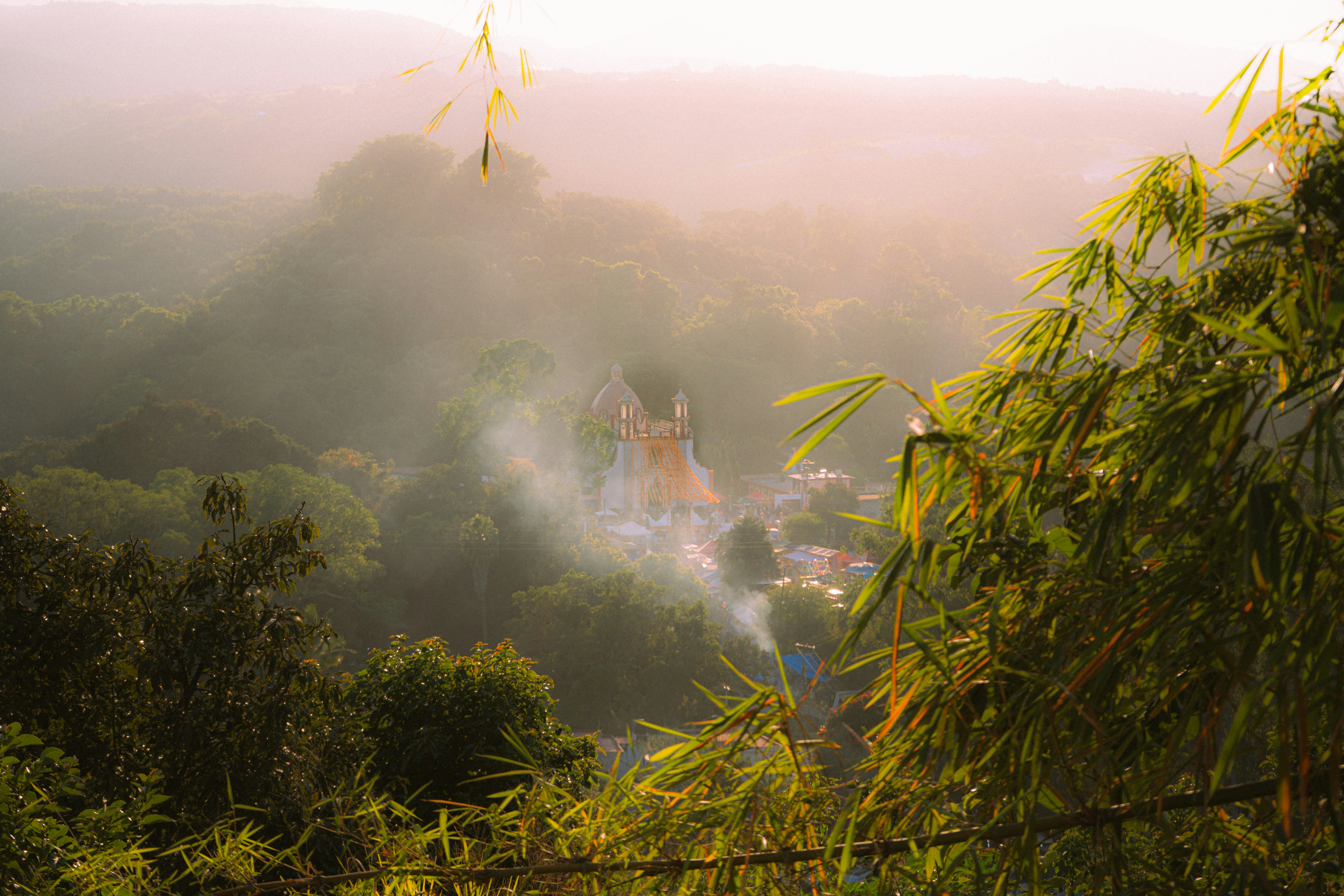 Sunlit Temple in a Misty Valley
