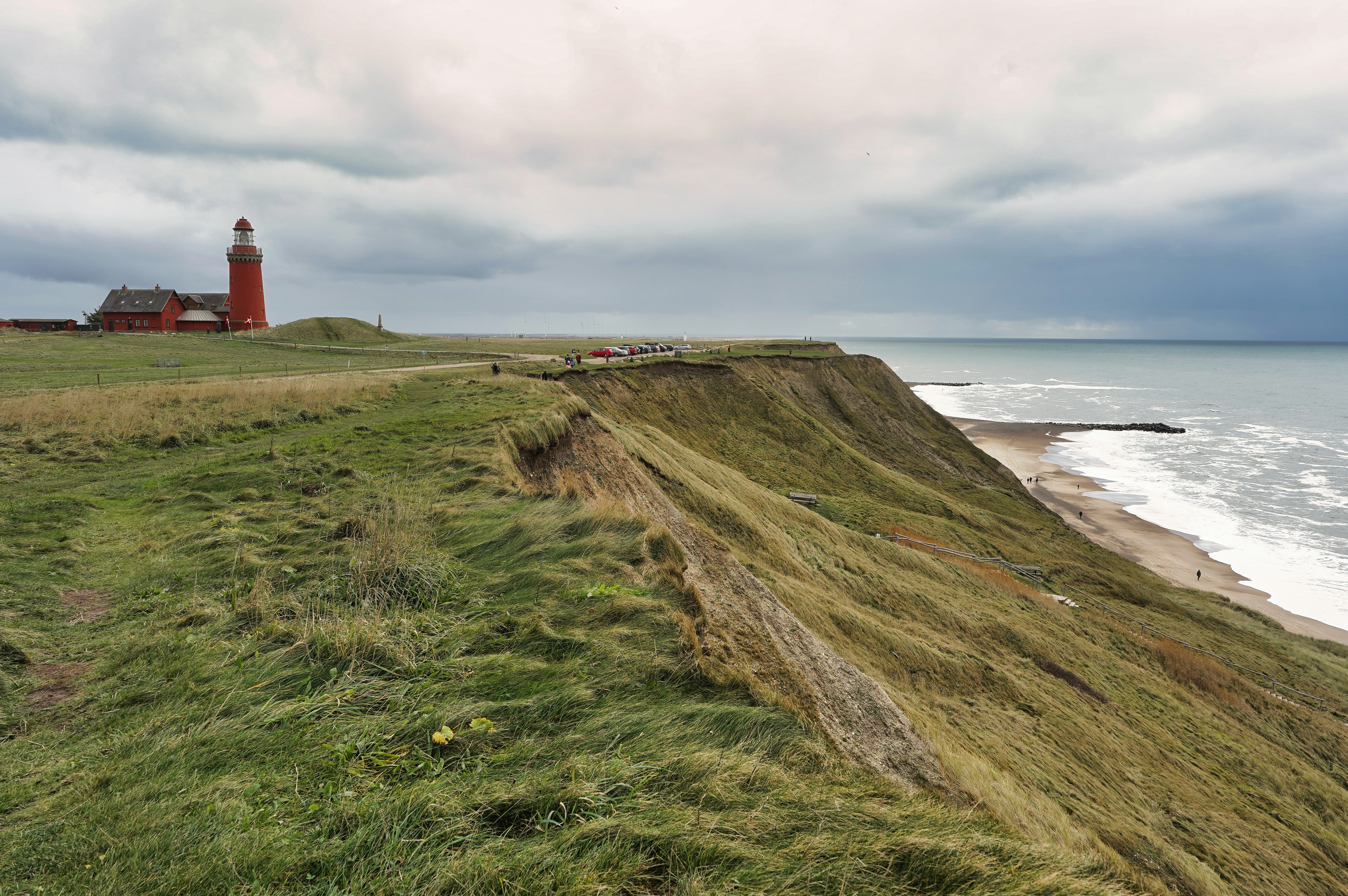 Lighthouse on the Cliff: Tide Line and Red Beacon
