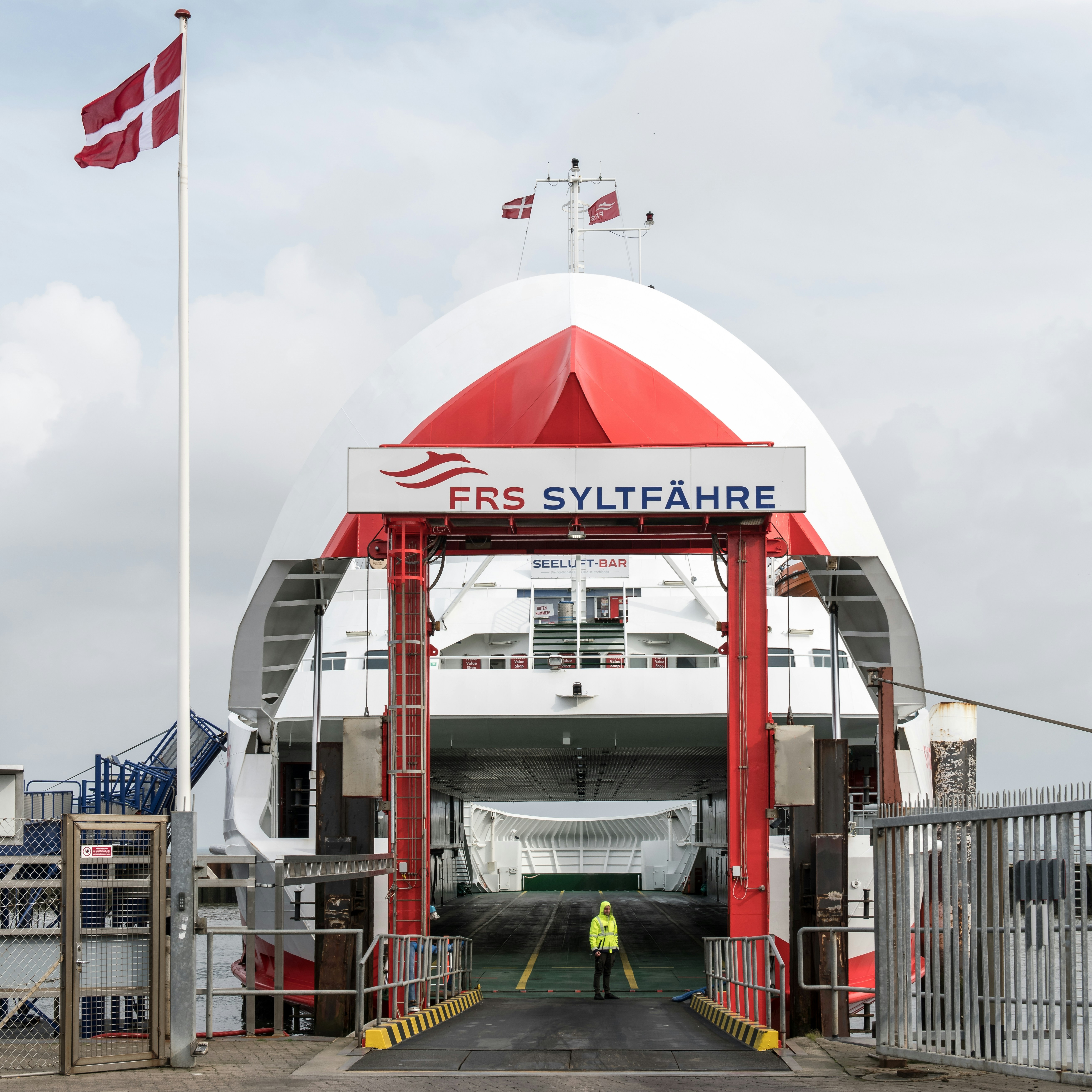 Gateway to the Ferry: Red Archway and Dock Entrance