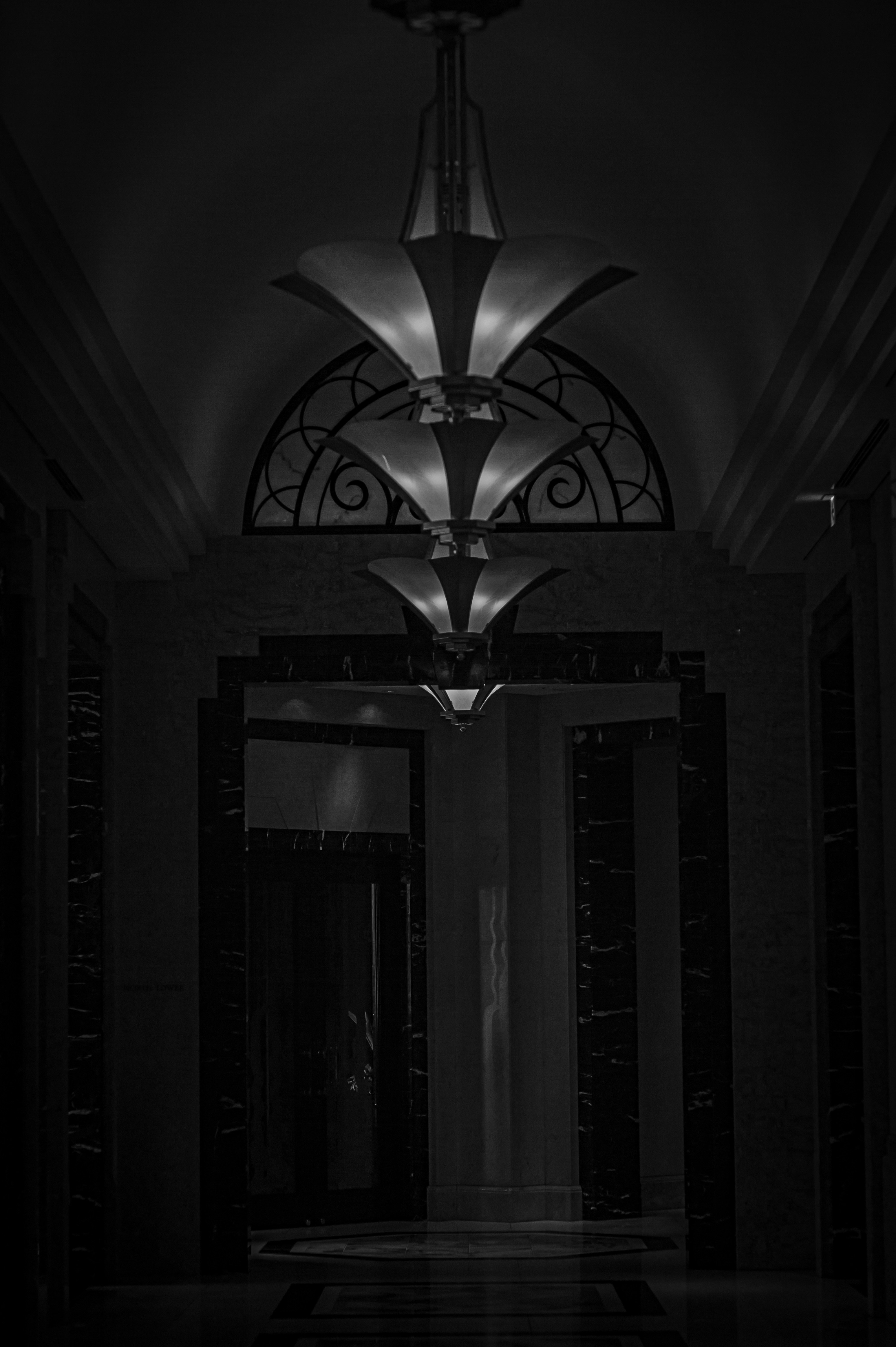 Symmetry in the Marble Hall: Lamps, Pillars and Reflections