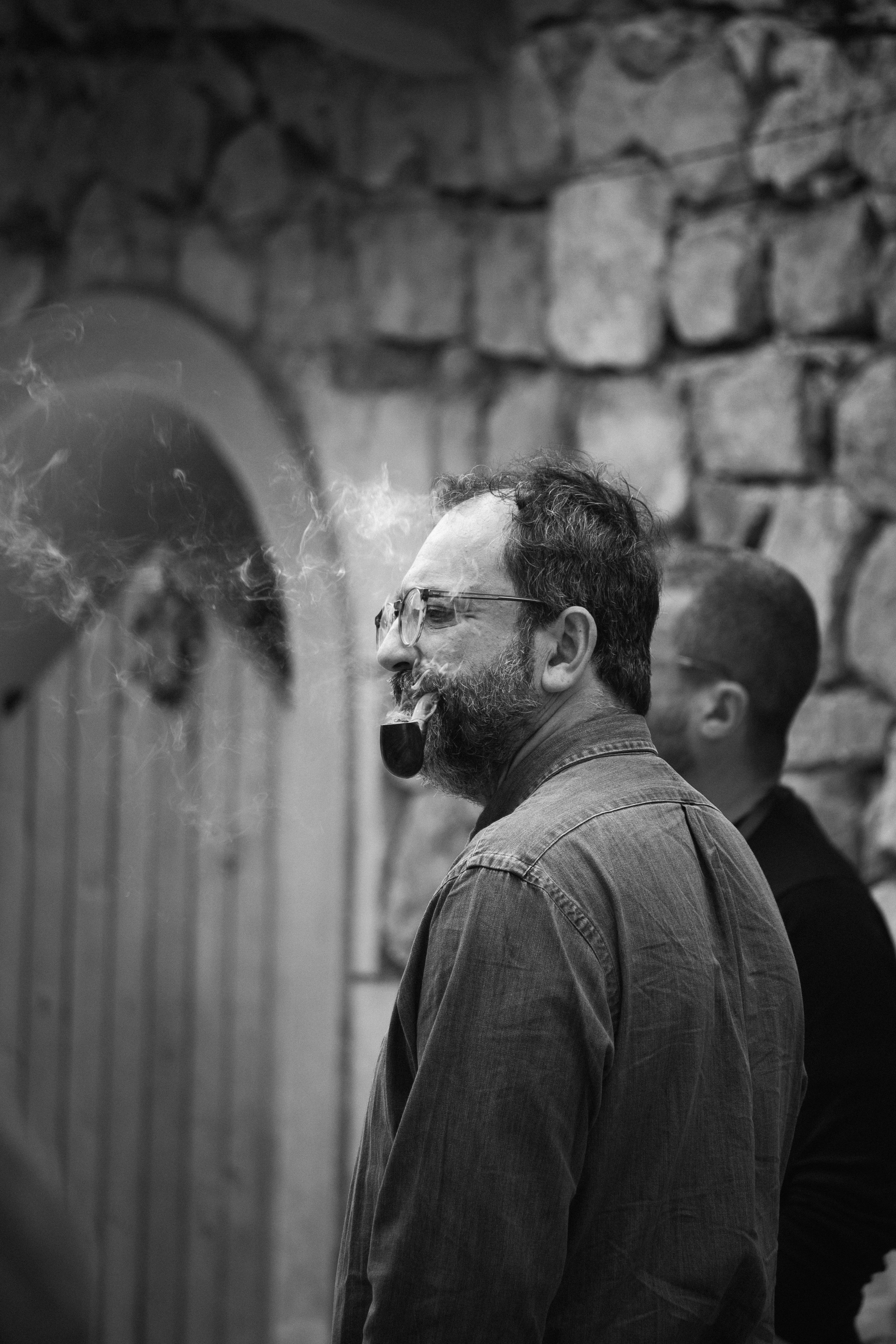 Smokestack of Thought: A Man in Profile with a Pipe