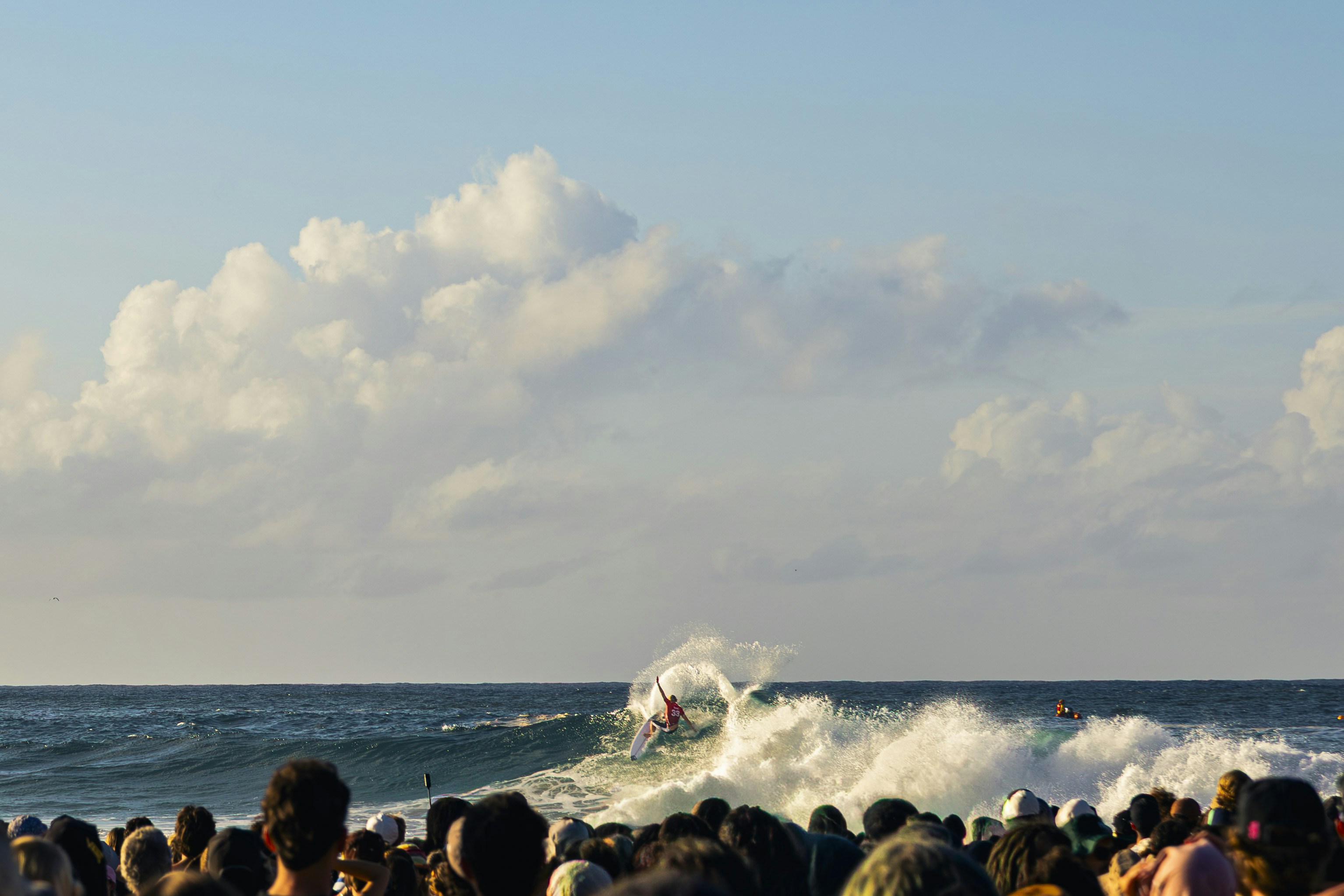 Wall of Spray: A Surf Rider Conquers a Cresting Wave