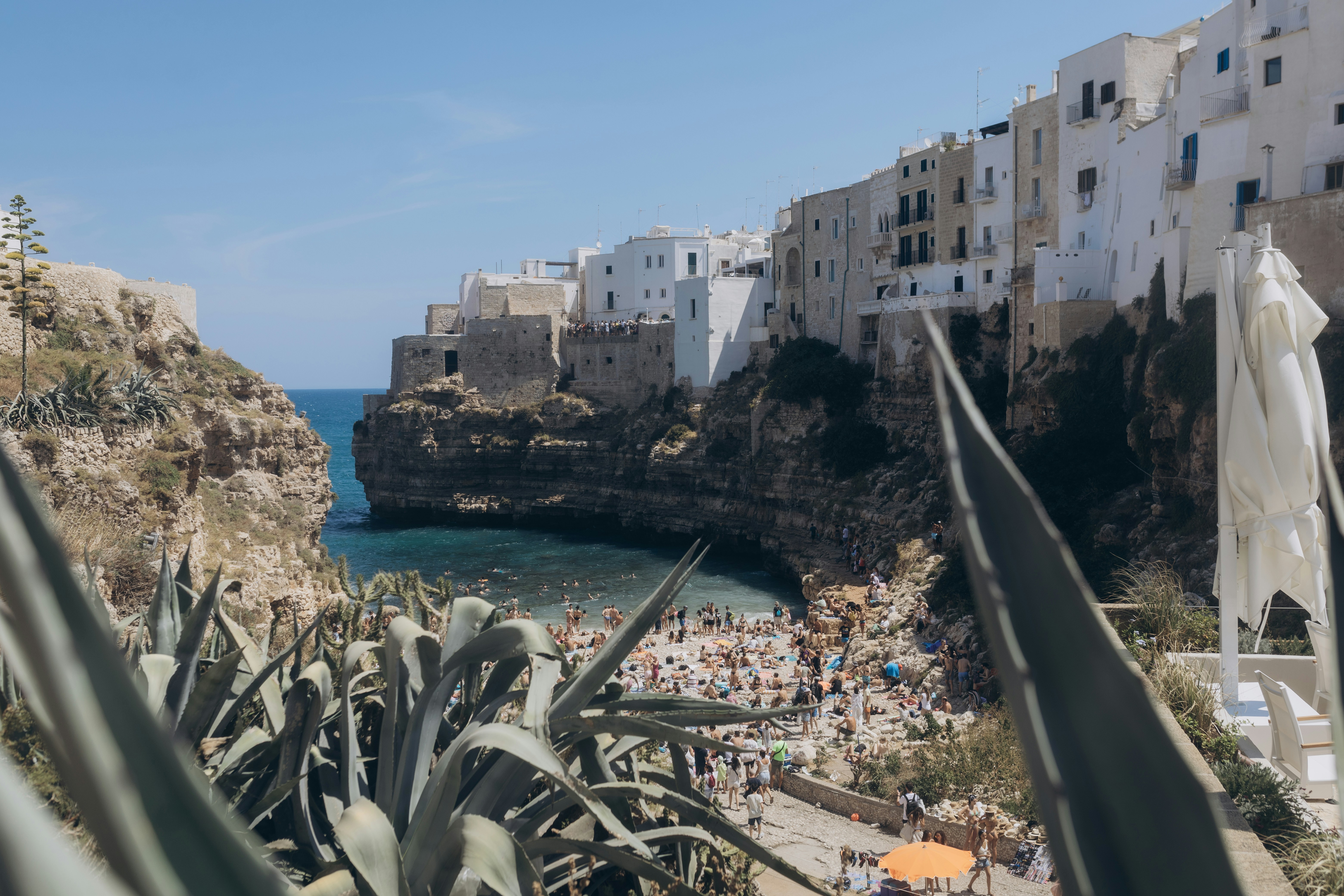 Cliffside White Town Framed by Succulent Green Foreground